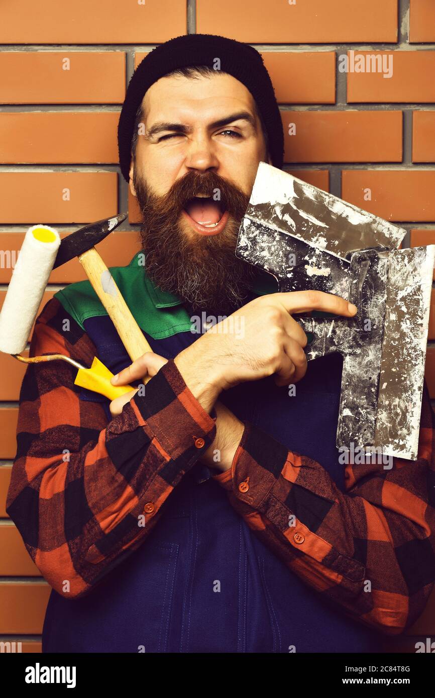 bearded builder man, long beard, brutal caucasian hipster with ...
