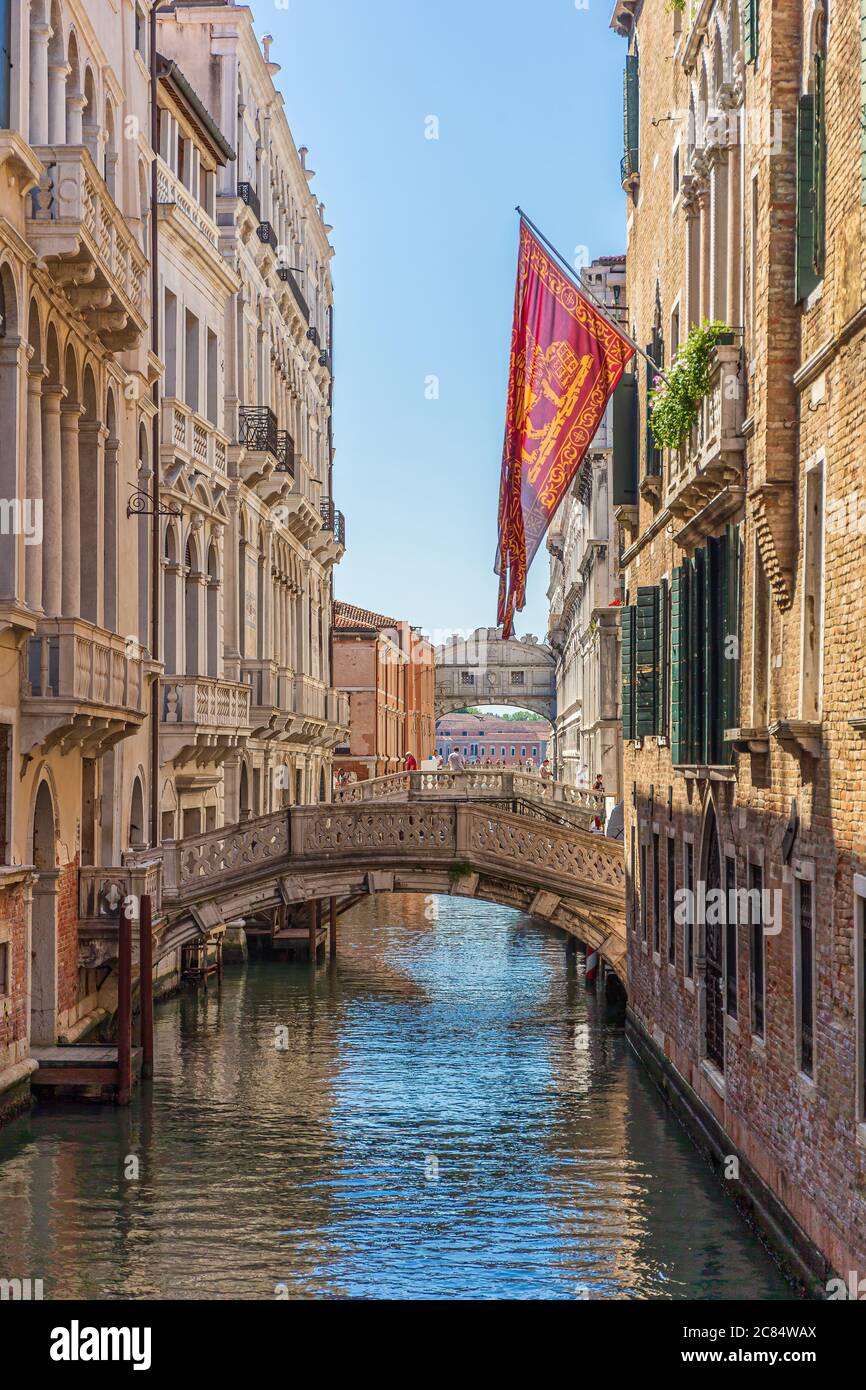 Vertical shot of a canal with bridge in Venice, Italy Stock Photo - Alamy