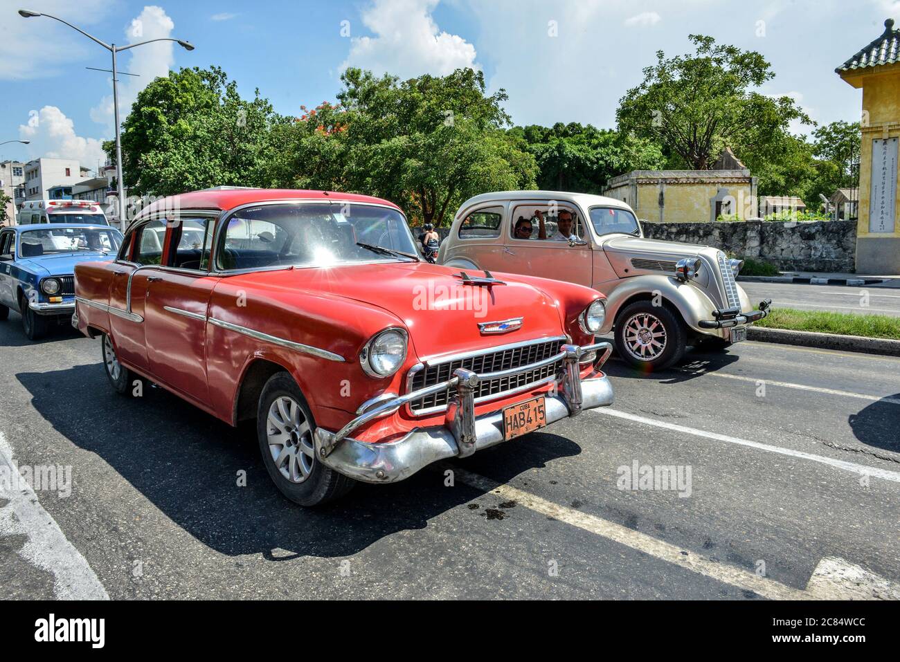 Cuba, Havana: classic American cars. Red classic Chevrolet at the red ...