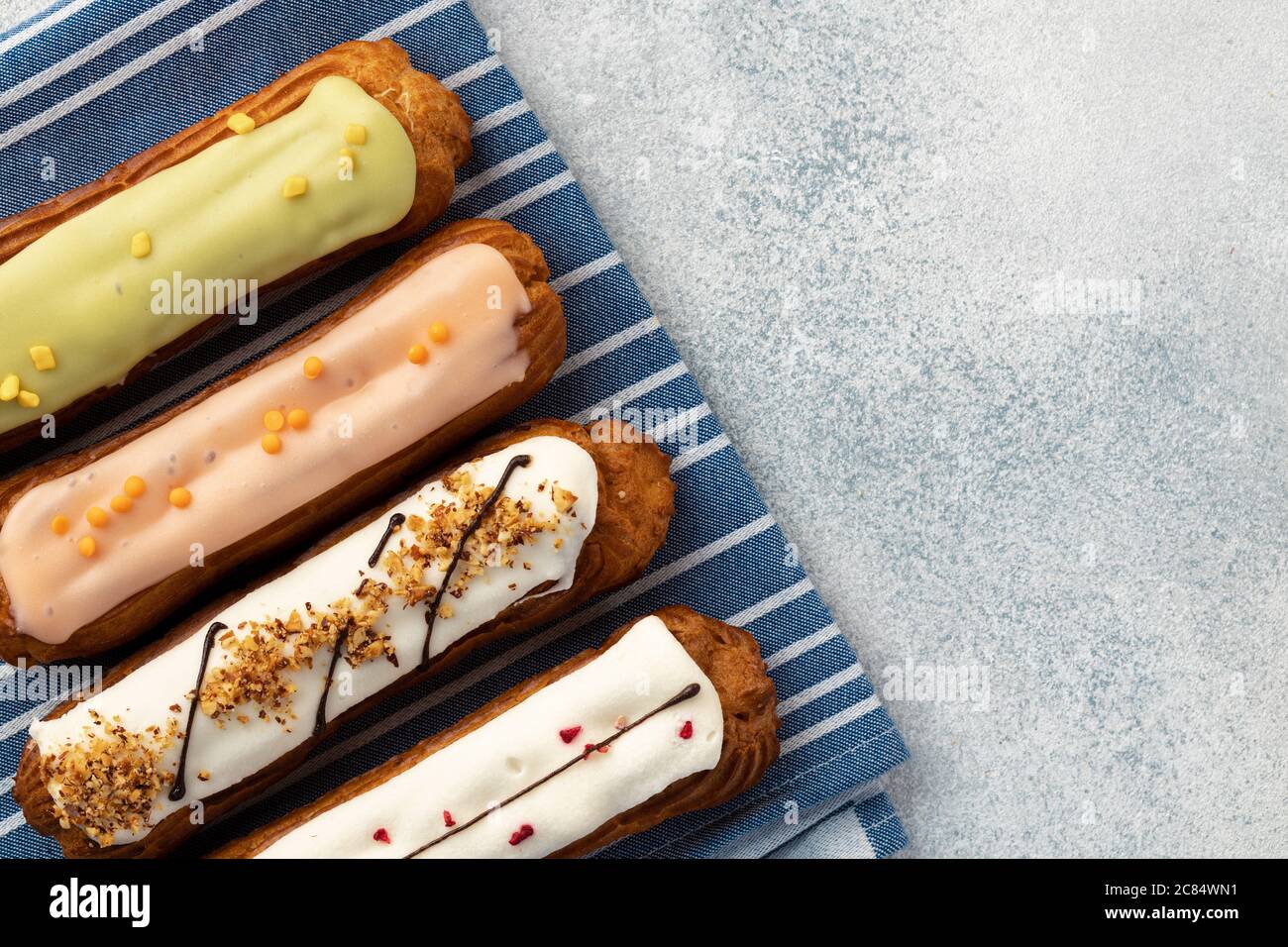 Close up photo of fresh french eclair cake with icing Stock Photo - Alamy