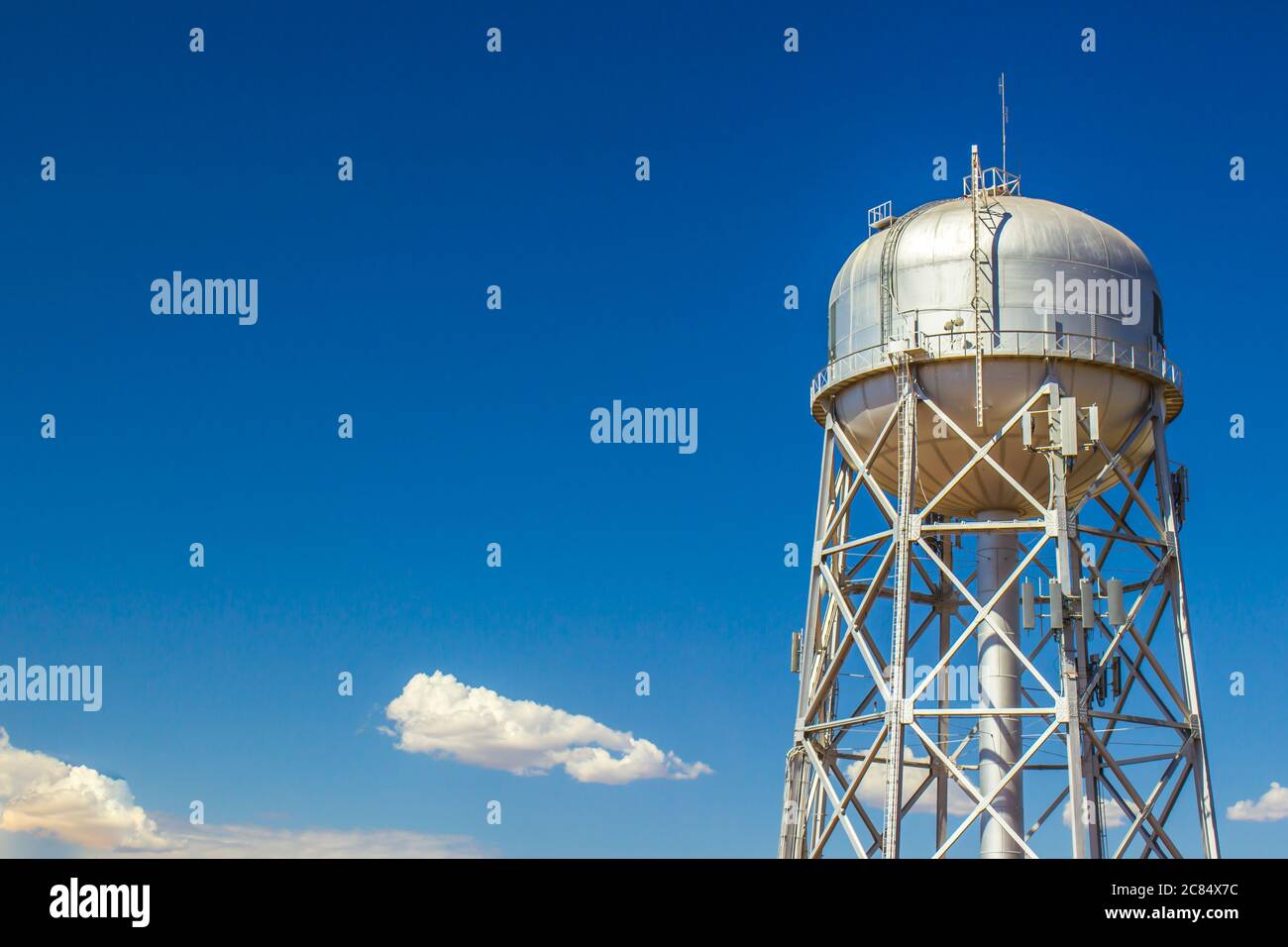 Large Water Tank Tower With Communication Antenna's Stock Photo - Alamy