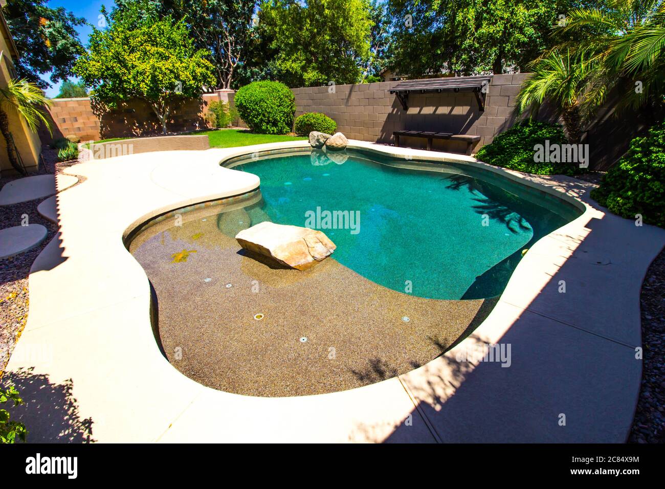 Rear Yard Free Form Swimming Pool Stock Photo - Alamy