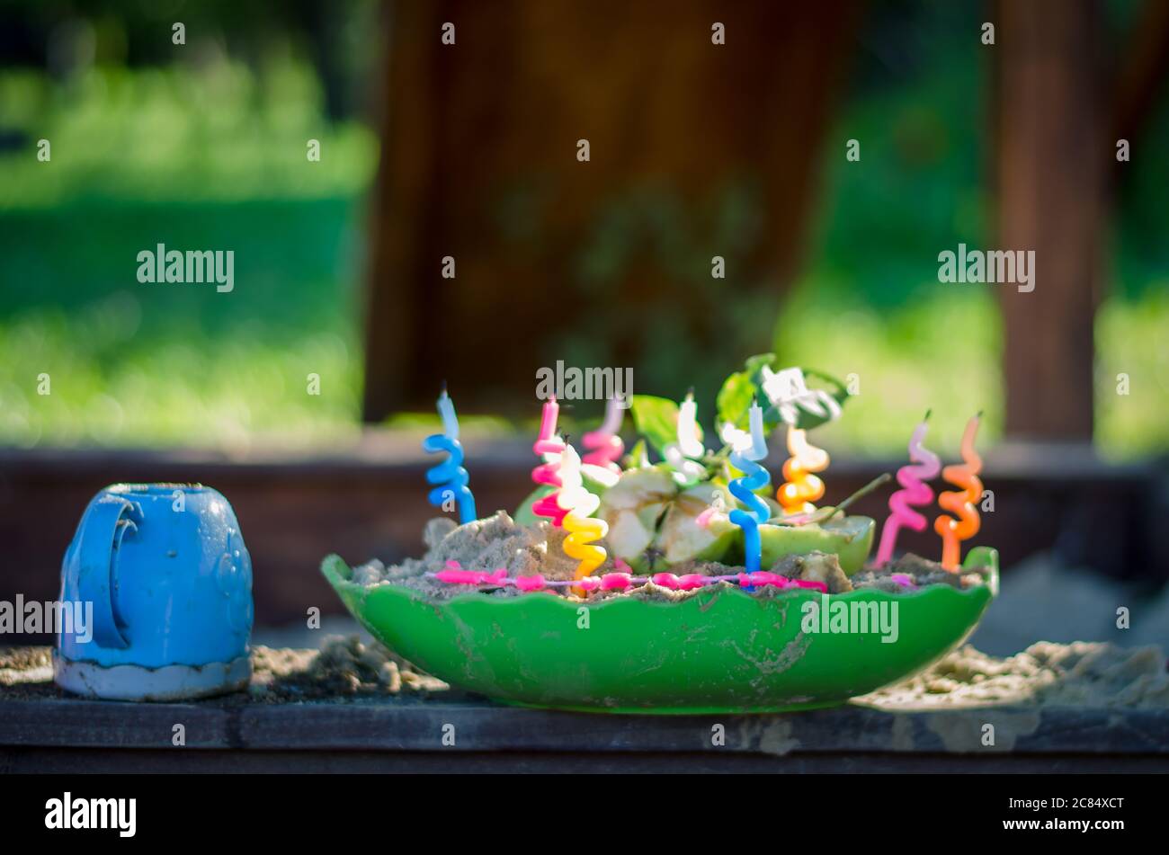 children birthday cake made from sand in the playground Stock Photo - Alamy