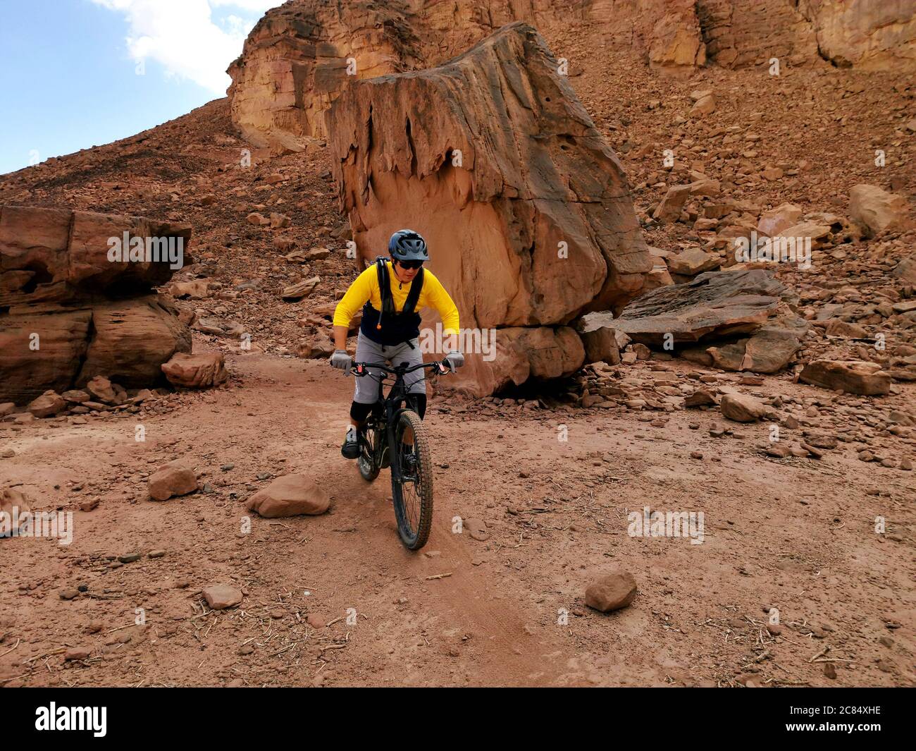 Mountain bike among red copper mountains in the desert. National Park ...