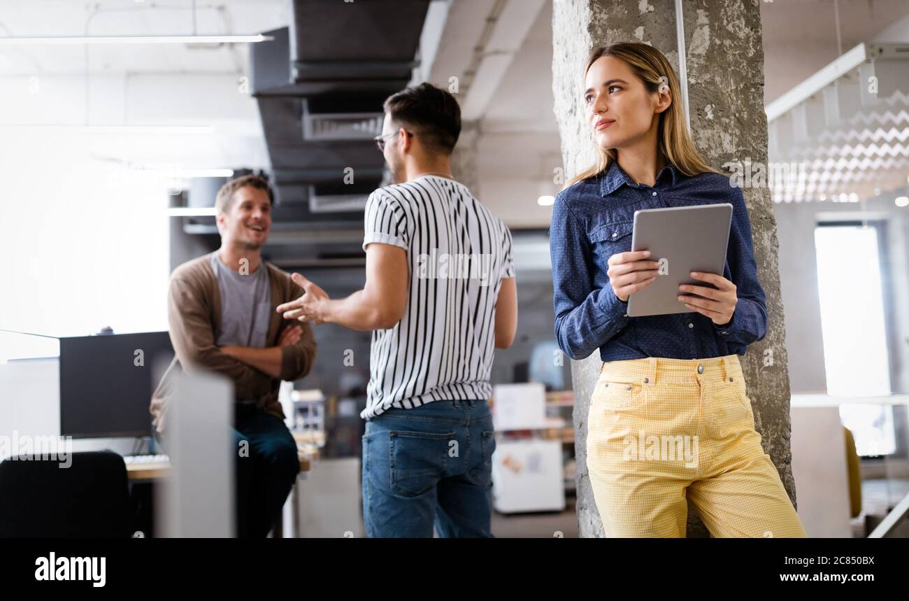 Happy creative team in office. Business, startup, design, people and ...