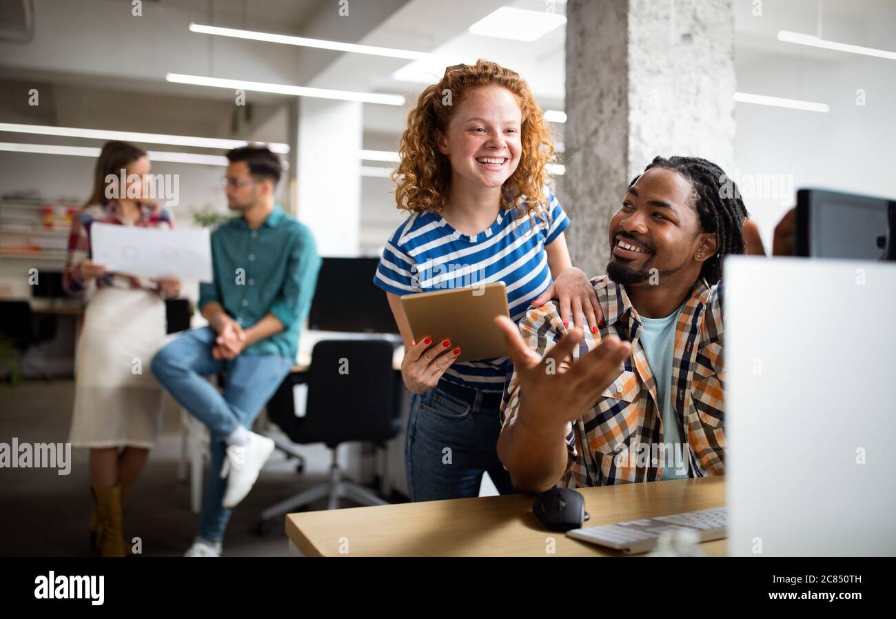 Business people having fun and chatting at workplace office Stock Photo ...