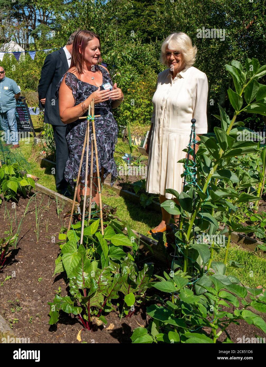 The Duchess of Cornwall is shown around the community garden during a ...