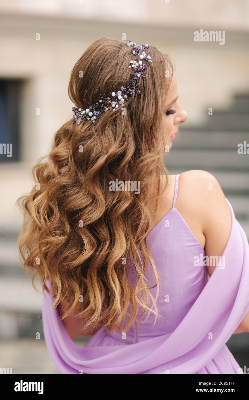 Back view of elegant woman with beautiful hair style Stock Photo - Alamy