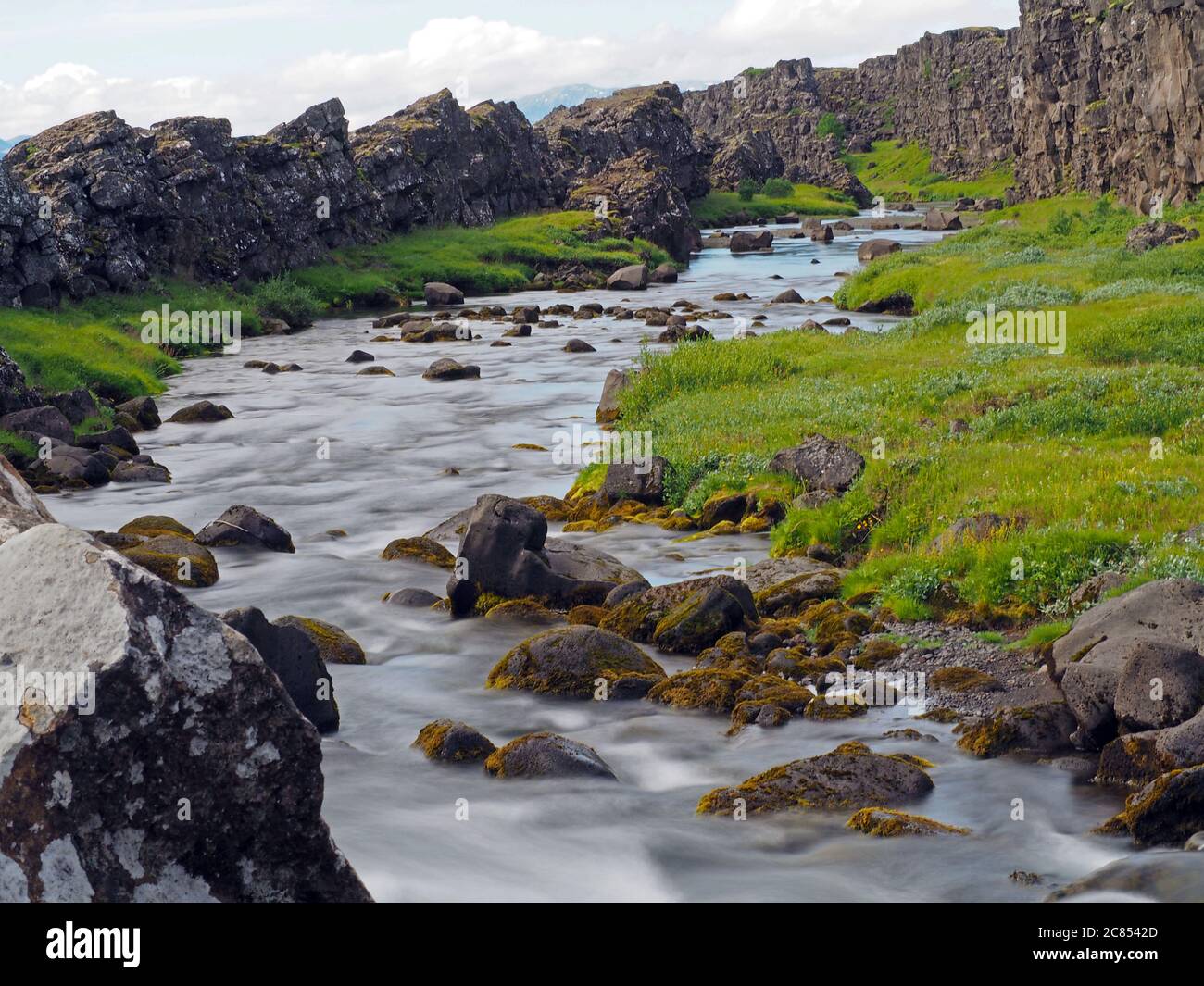 melted river in the Thingvellir national park in Mid-Atlantic Ridge ...