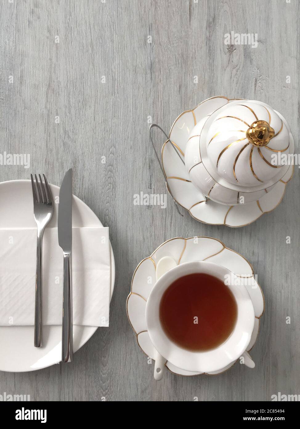 Top down view of a tea drinking setting with white porcelain ware Stock ...