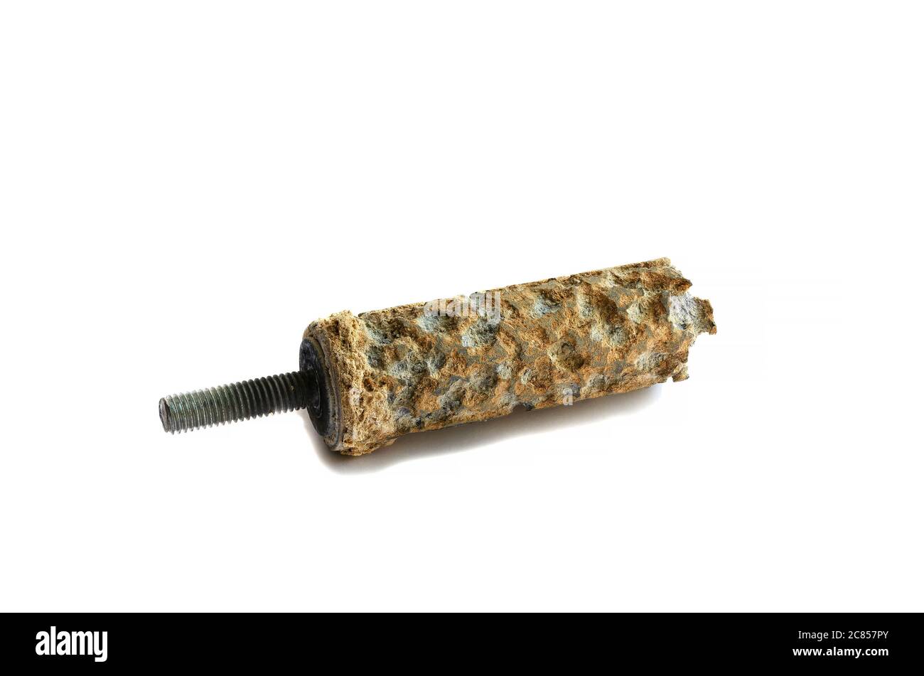Old anode of a water heater. Worn magnesium anode. Rod to protect the ...