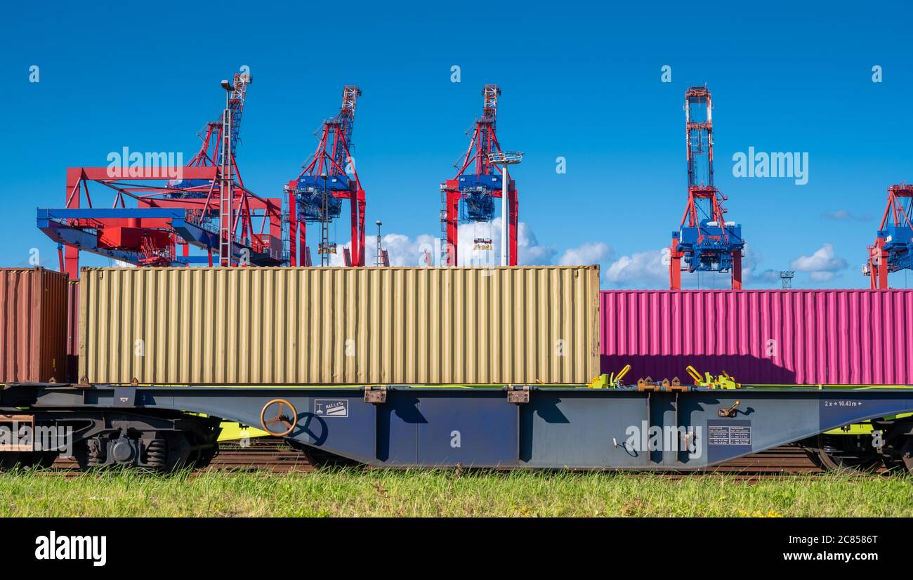 A train loaded with ship container at the port of Hamburg, Germany ...