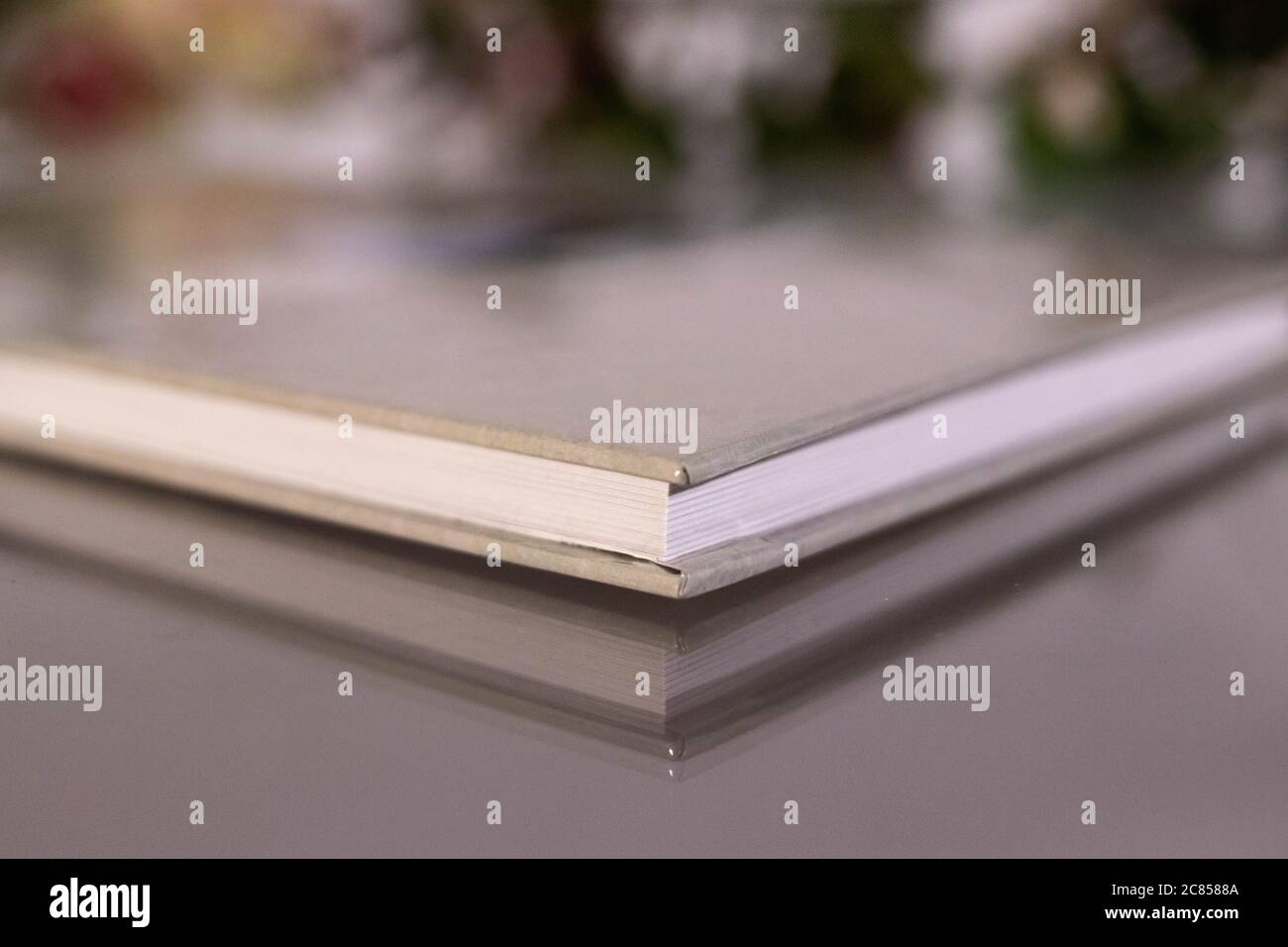 Solid photo wedding book with light cover Stock Photo - Alamy