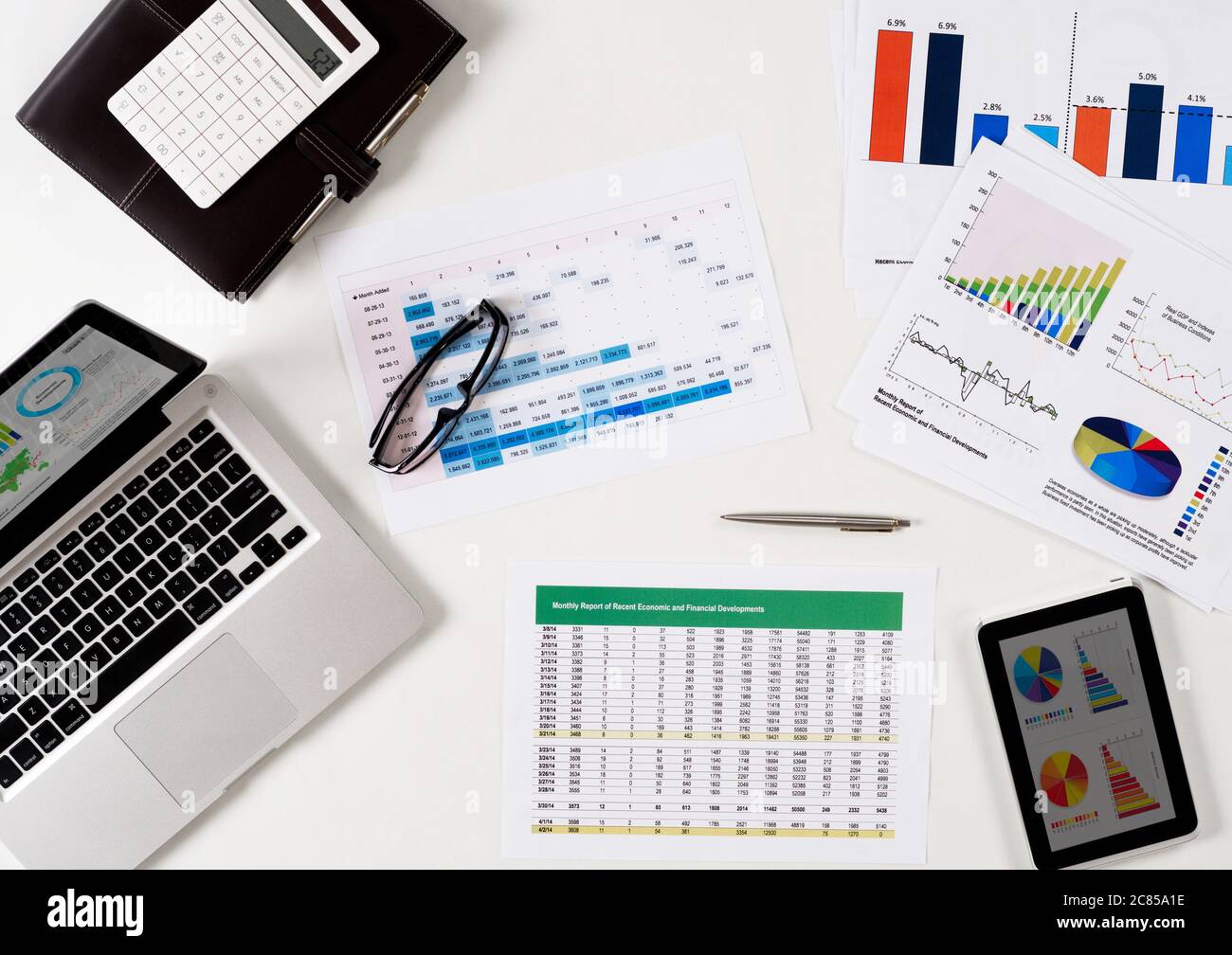 Financial papers on desk Stock Photo - Alamy