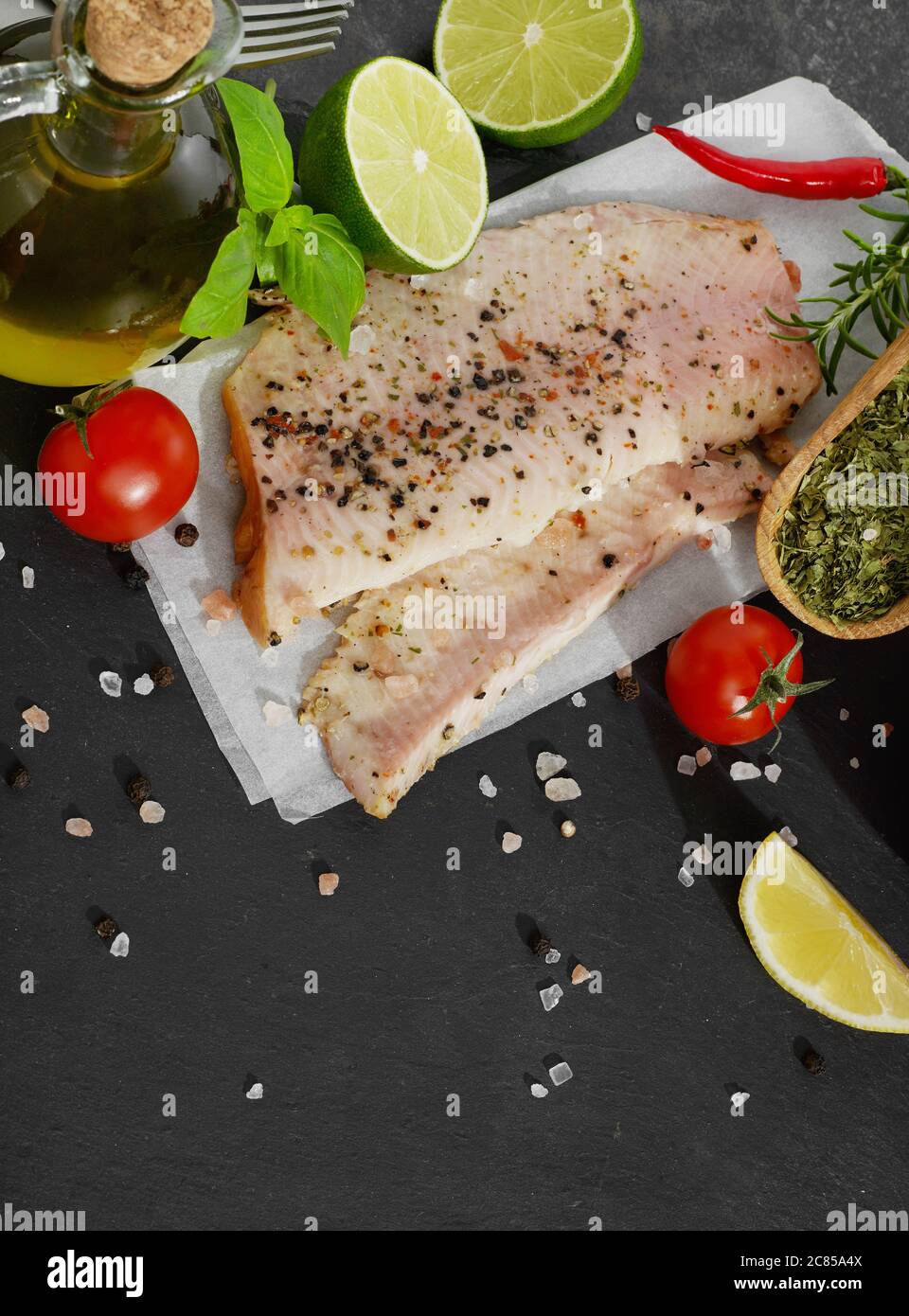 Fish fillet and seasoning Stock Photo - Alamy