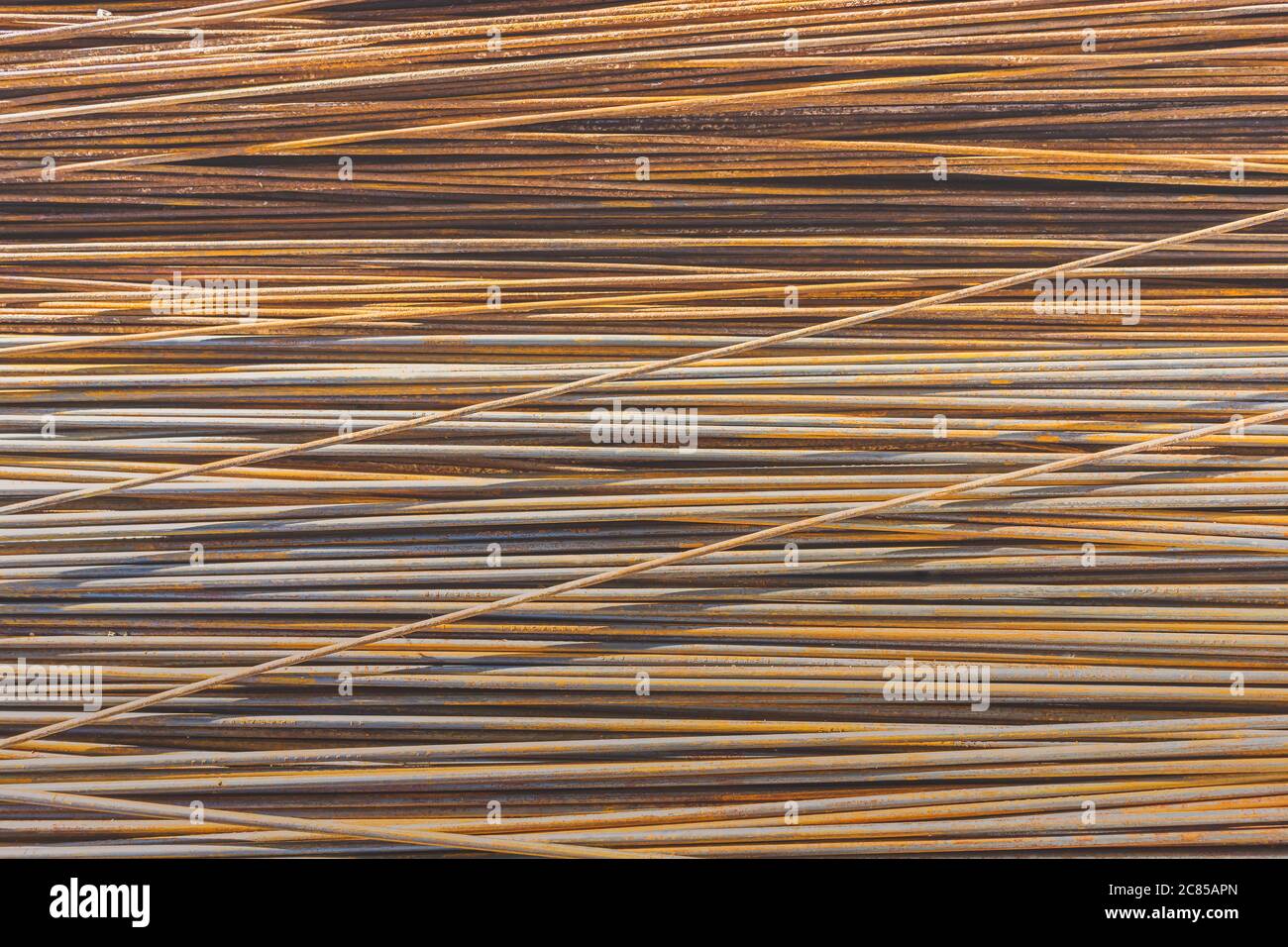 Background texture of old rusty steel bars construction materials in a ...