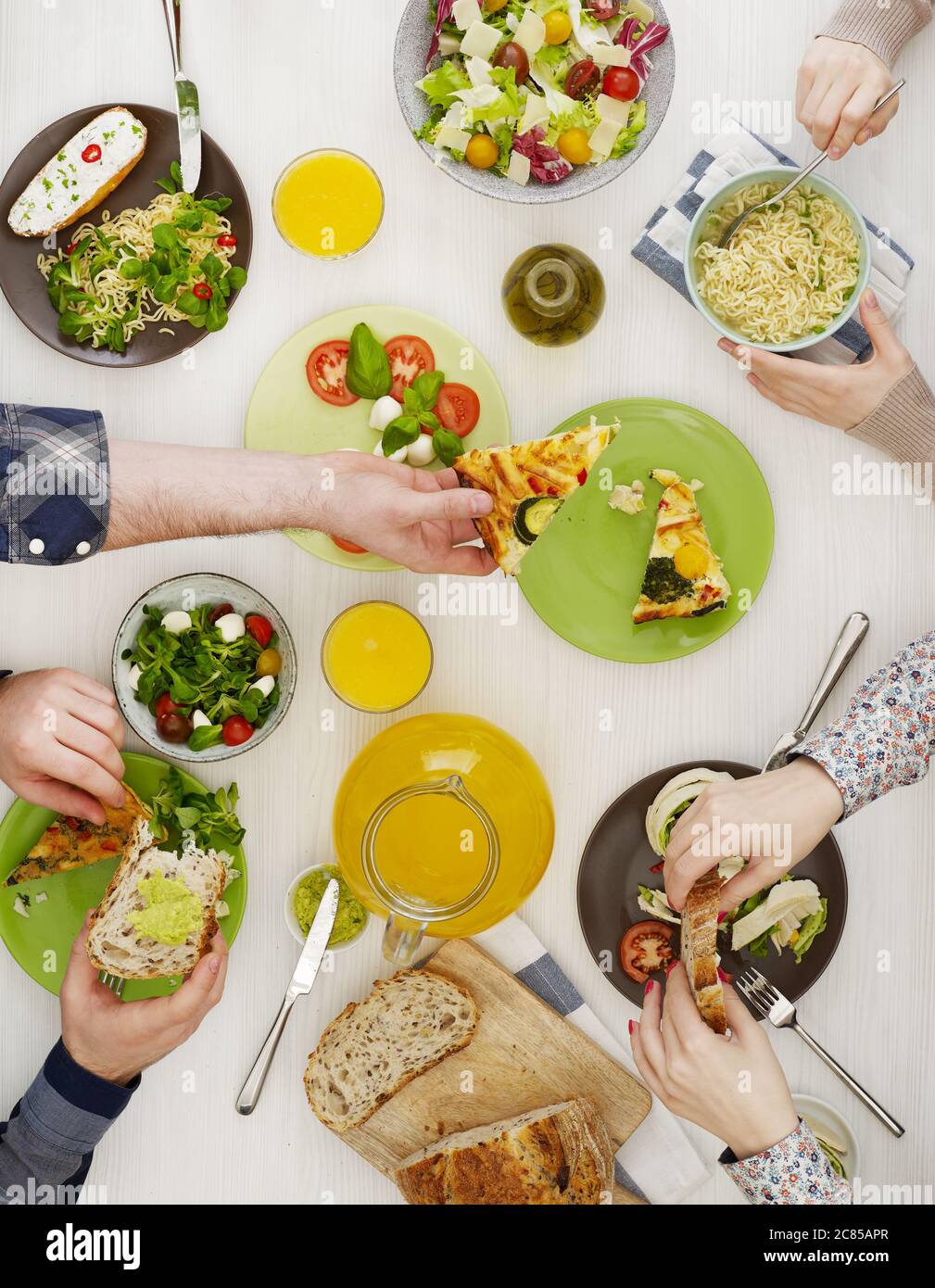 People at dinner table Stock Photo - Alamy