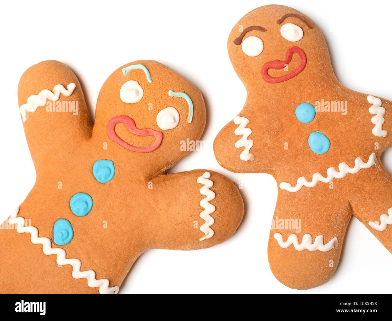 Gingerbread men isolated on white Stock Photo - Alamy