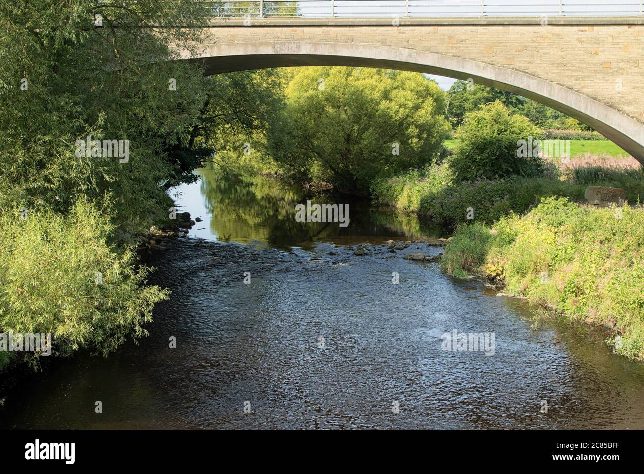 The Nidd River and a bridge seen from the Nidderdale Greenway ...