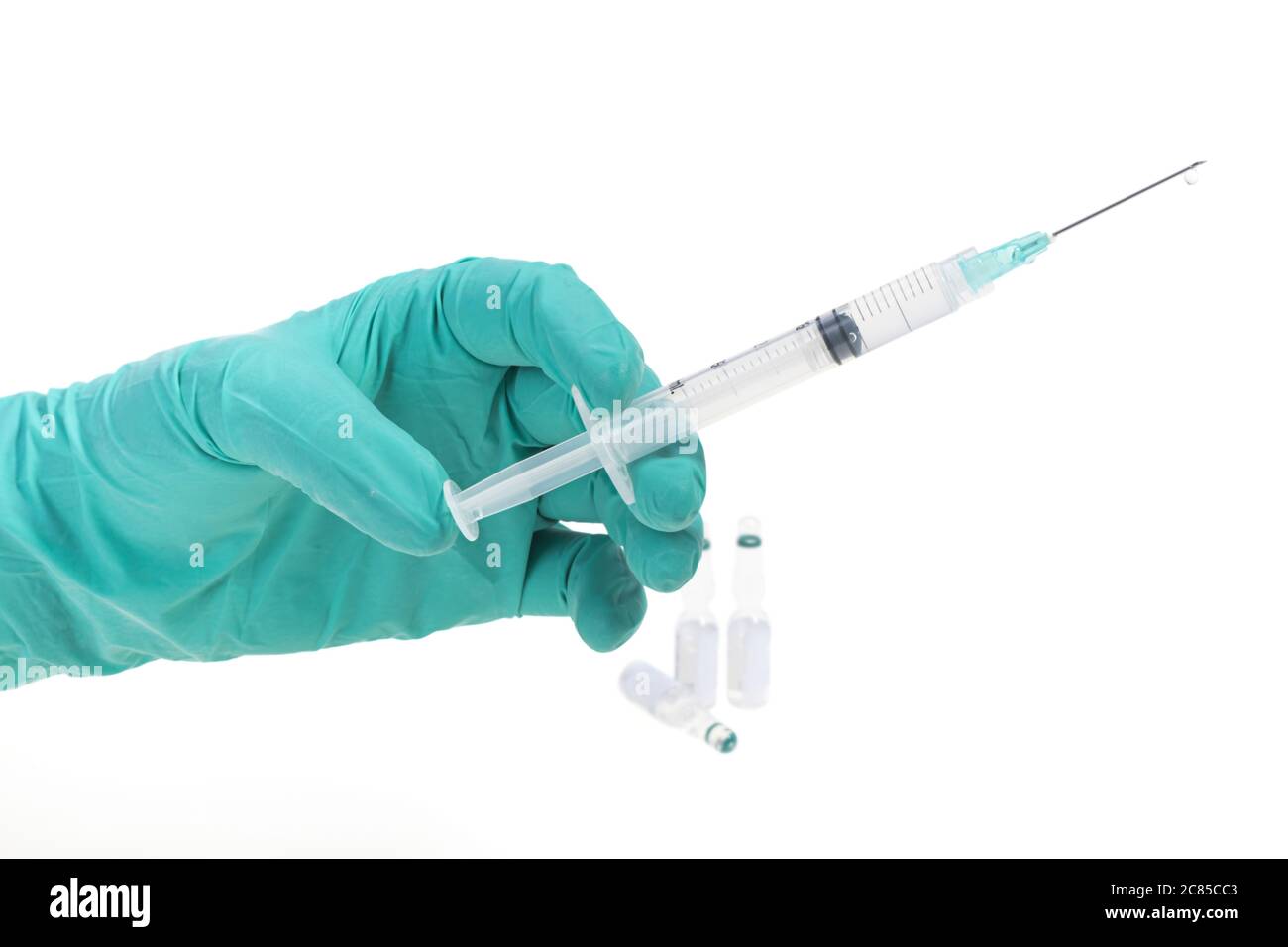 hand with syringe isolated on white, hand with syringe, vaccine ...