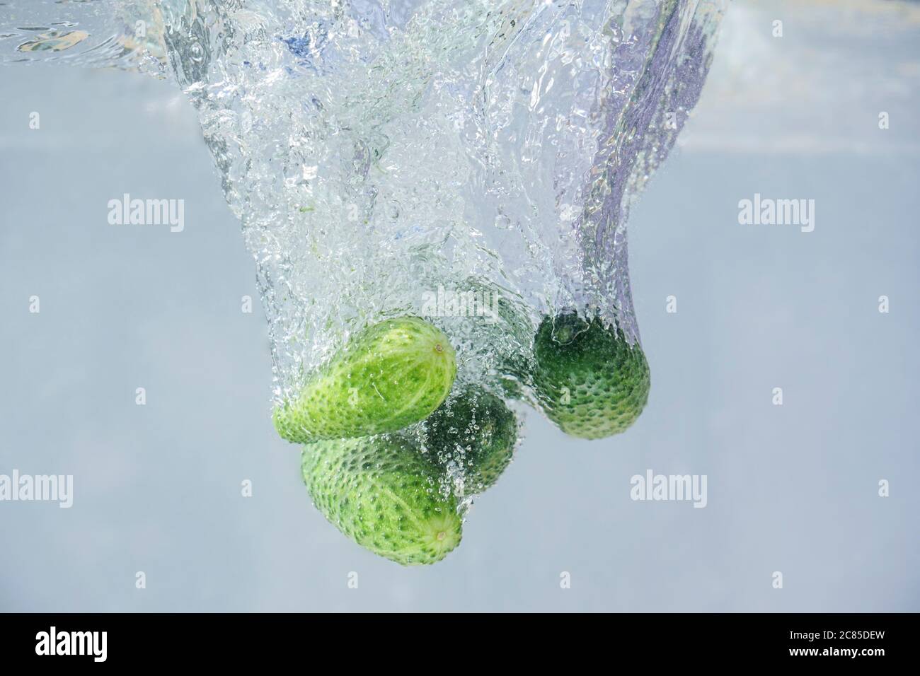 Cucumber washing hi-res stock photography and images - Alamy