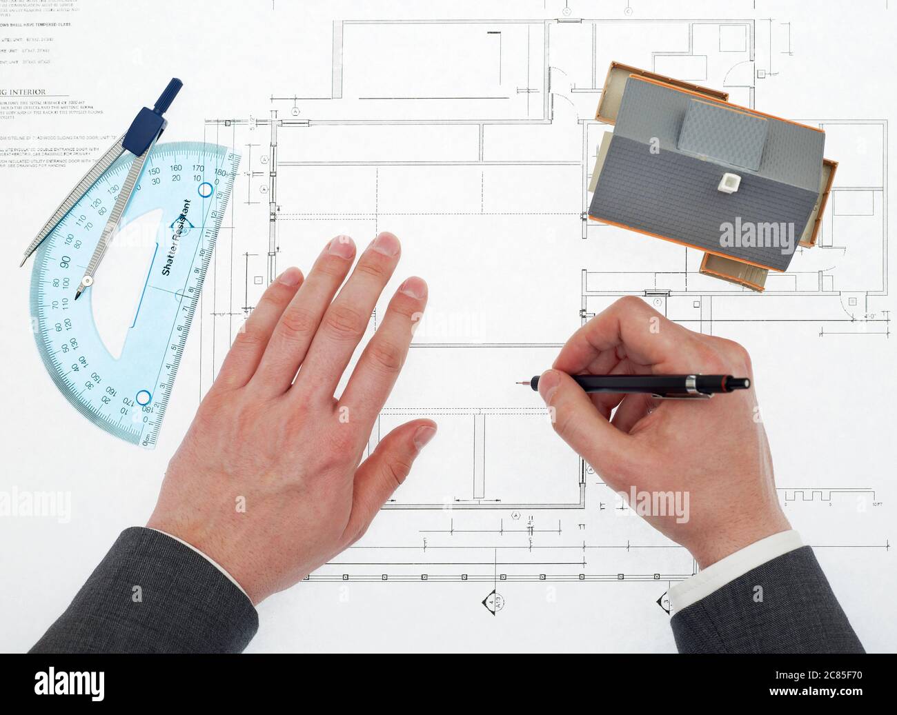 Architect taking notes Stock Photo - Alamy