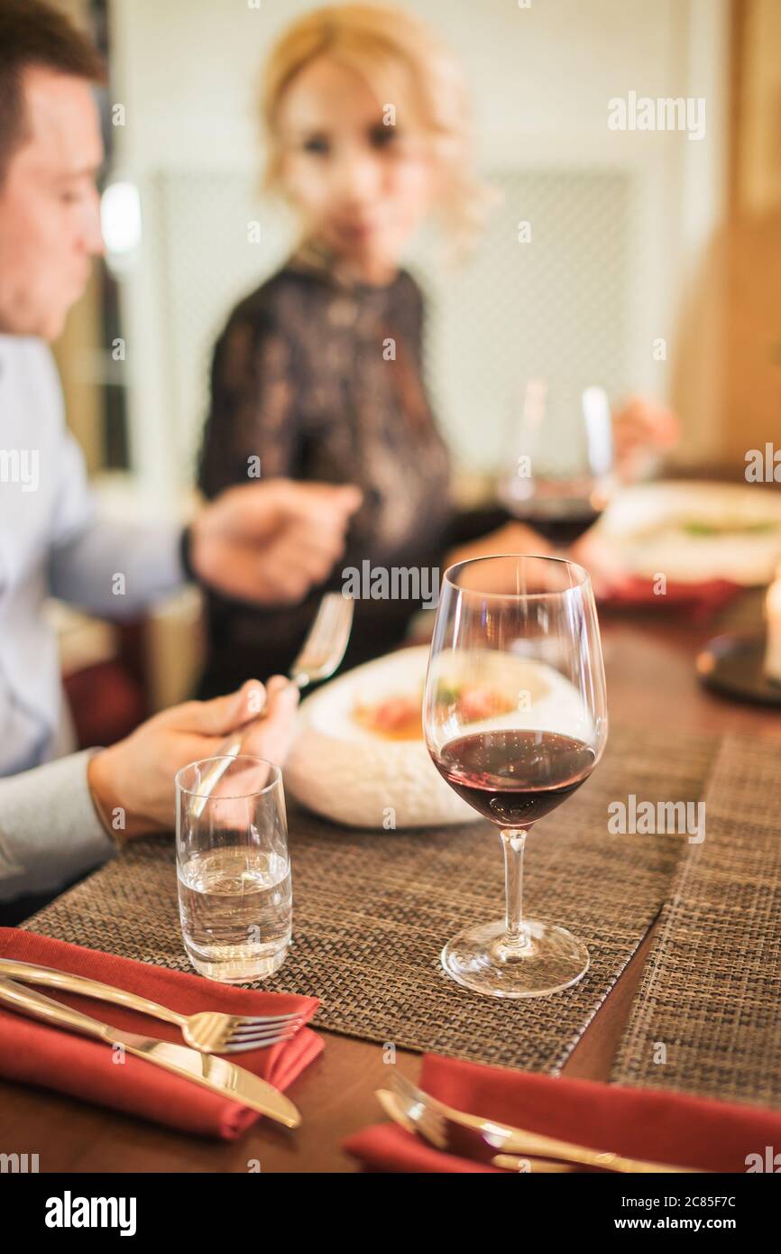 Happy loving couple enjoying breakfast in a cafe. Love, dating, food ...