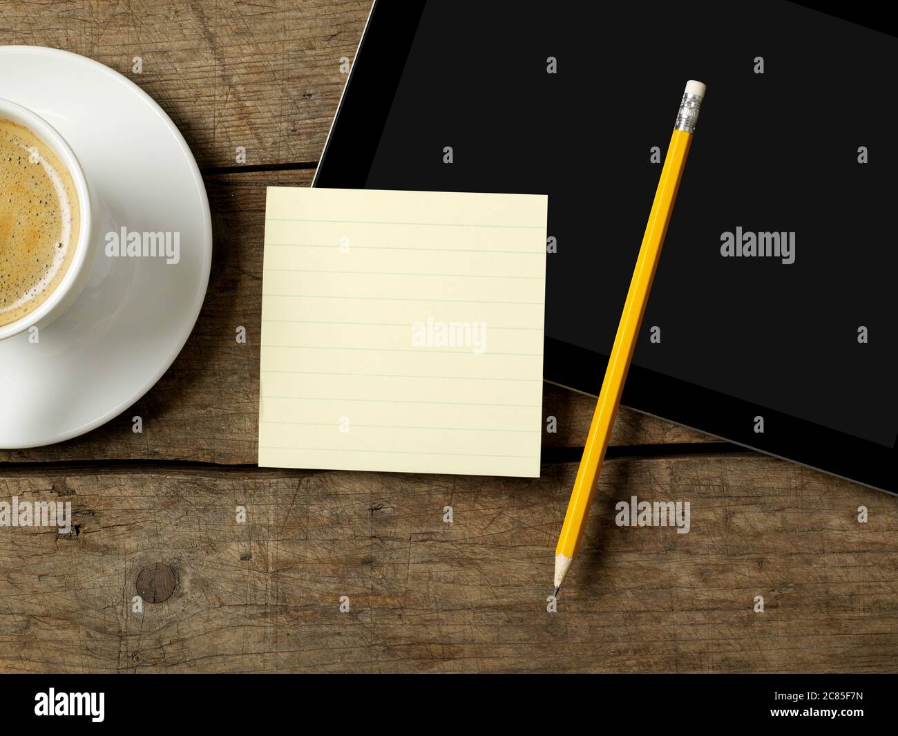 Adhesive note on desk Stock Photo - Alamy