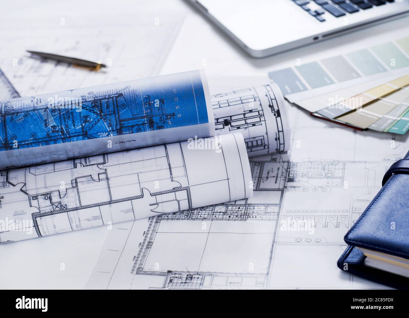 Blueprints on desk Stock Photo - Alamy