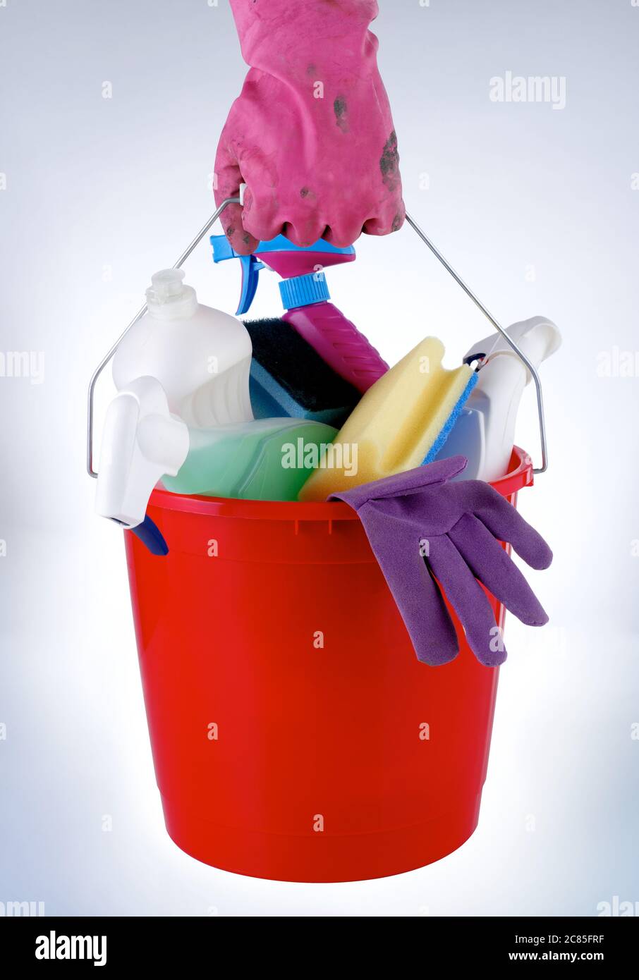 Hand with cleaning bucket Stock Photo - Alamy