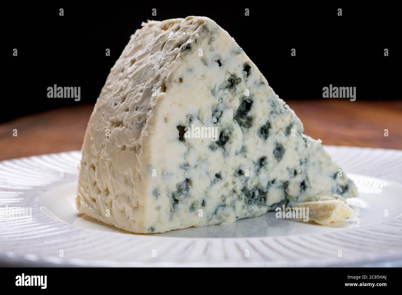 Cheese collection, piece of danish blue cheese with blue mold close up ...
