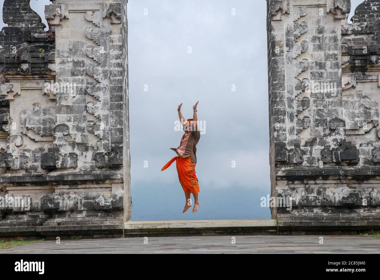 Bali, Indonesia. Traveler man jumping with energy and happiness in the ...