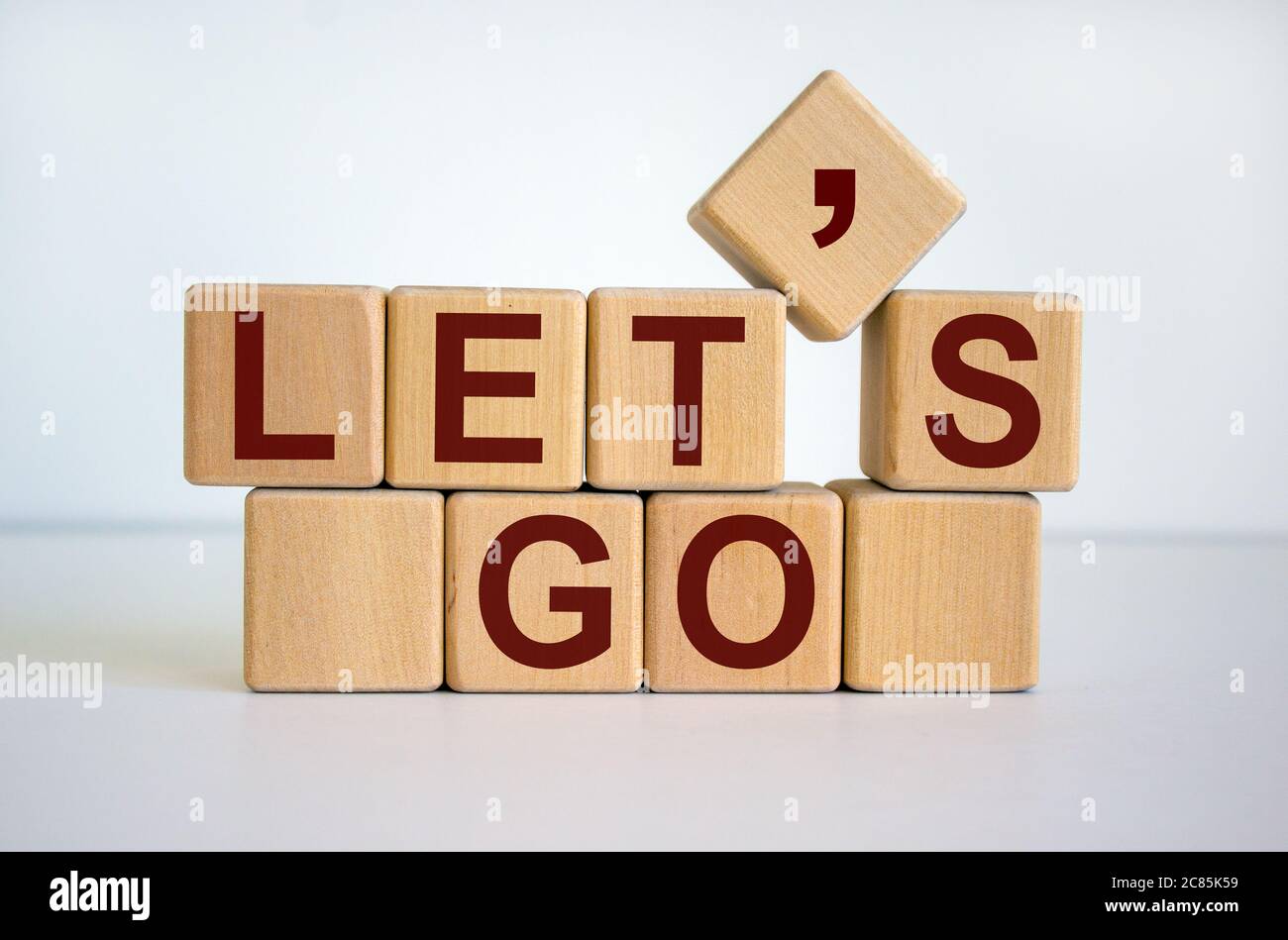Concept word 'lets go' on cubes on a beautiful white background Stock ... Concept word 'lets go' on cubes on a beautiful white background Stock ...