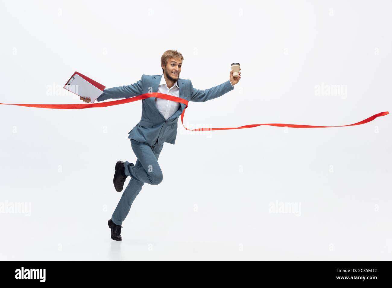 Career, success. Man in office clothes running, jogging on white ...