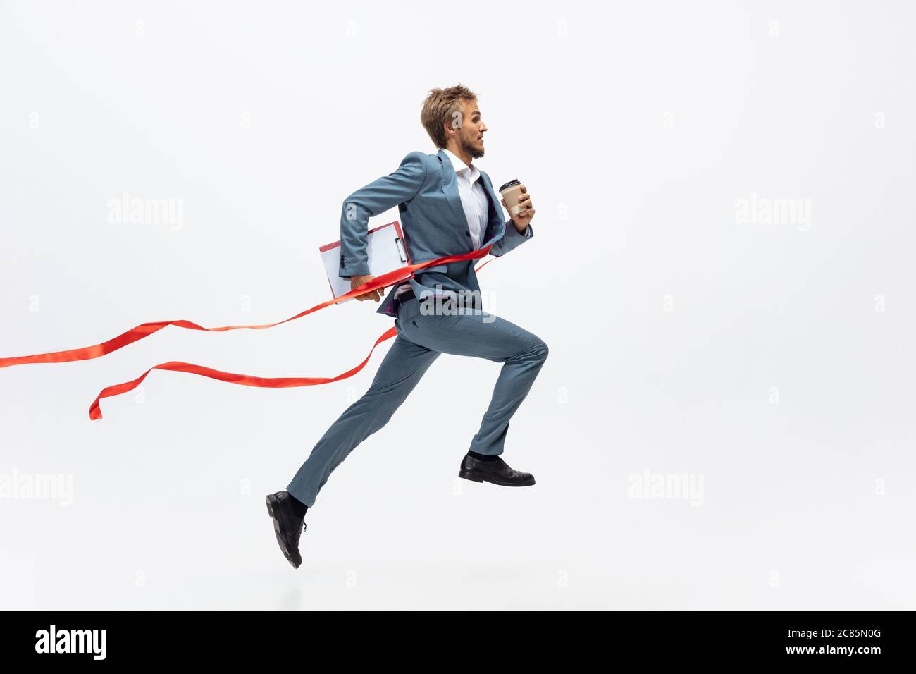 Career, success. Man in office clothes running, jogging on white ...