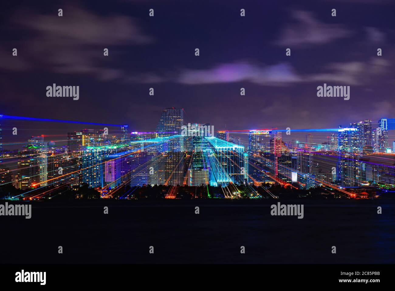 City lights. Miami skyline. Miami skyline at night - panoramic image ...