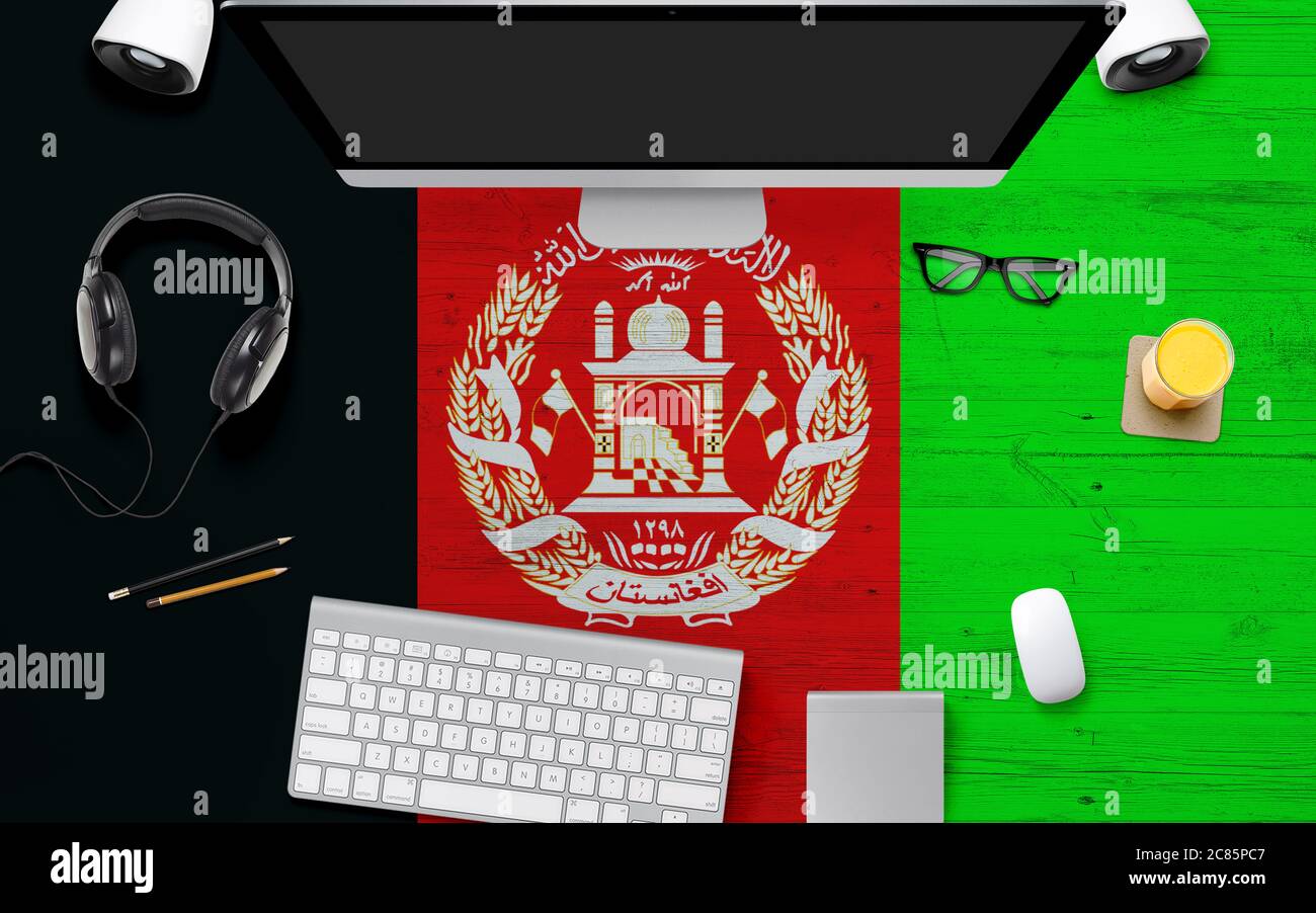 Afghanistan flag background with headphone,computer keyboard and mouse ...