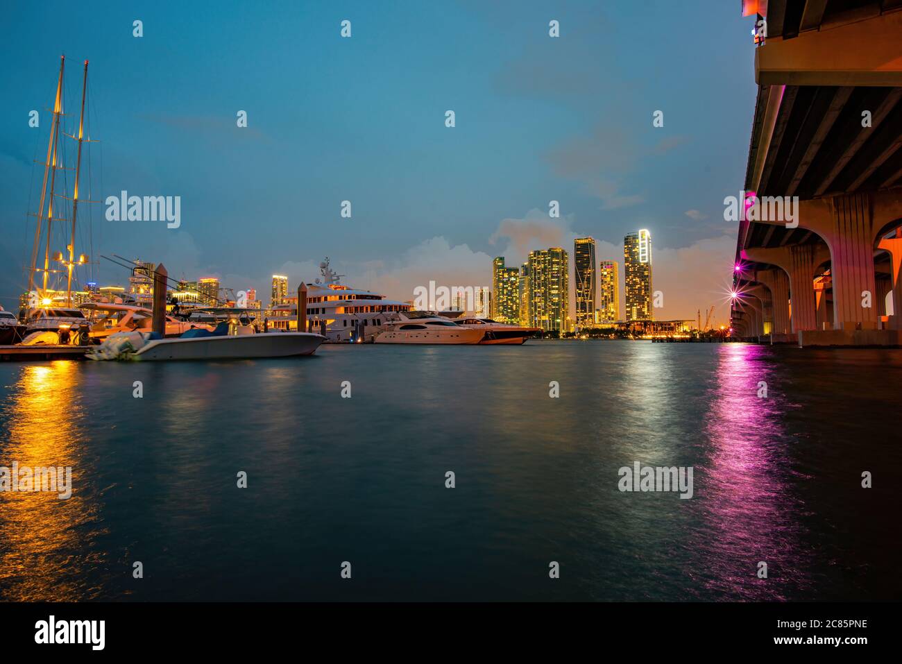Miami downtown. Miami south beach street view with water reflections at ...
