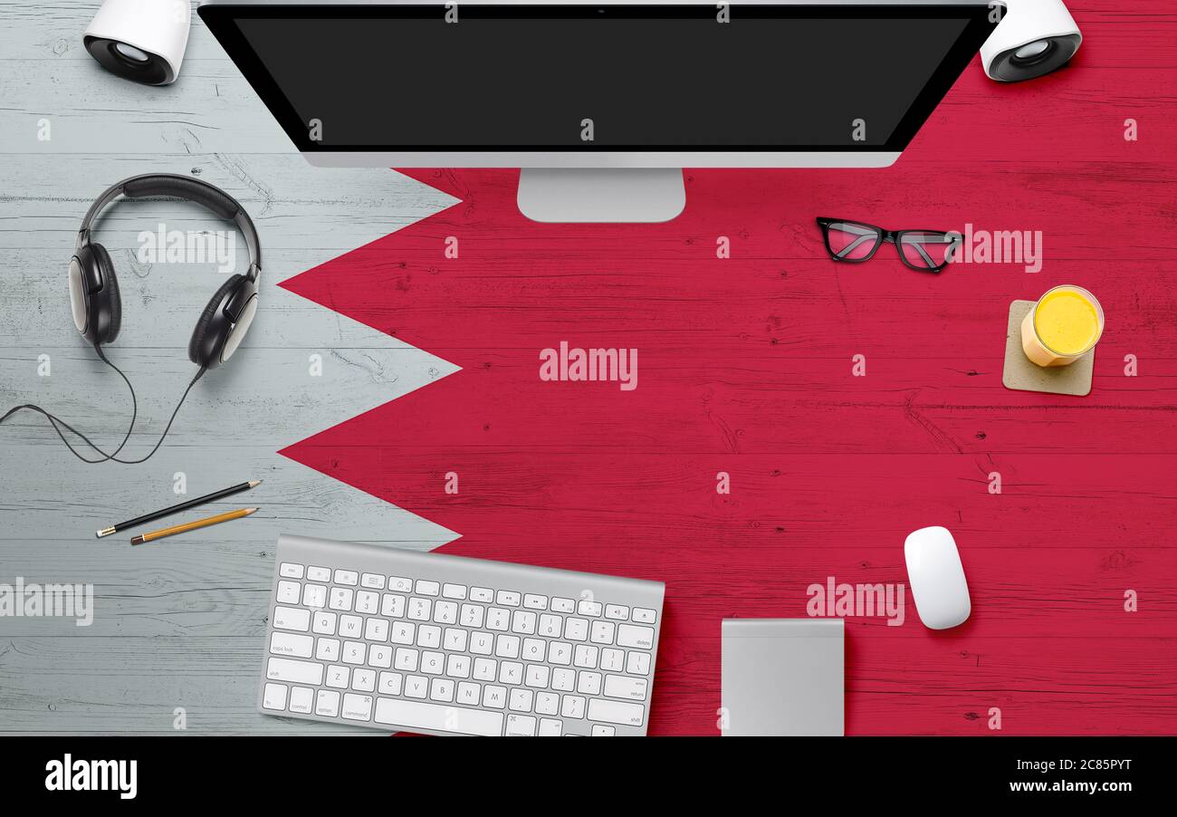 Bahrain flag background with headphone,computer keyboard and mouse on ...