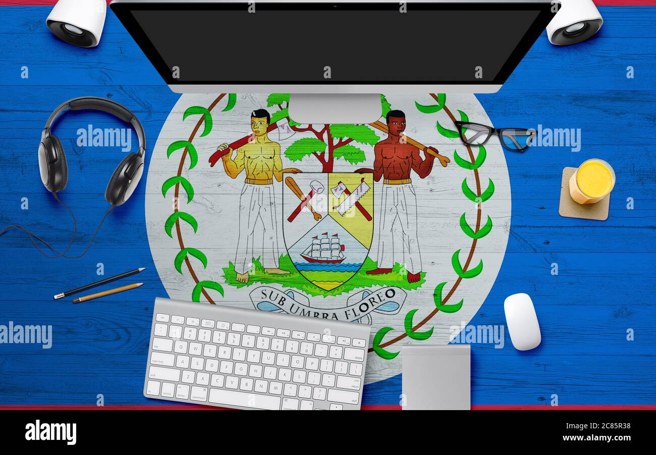 Belize flag background with headphone,computer keyboard and mouse on ...