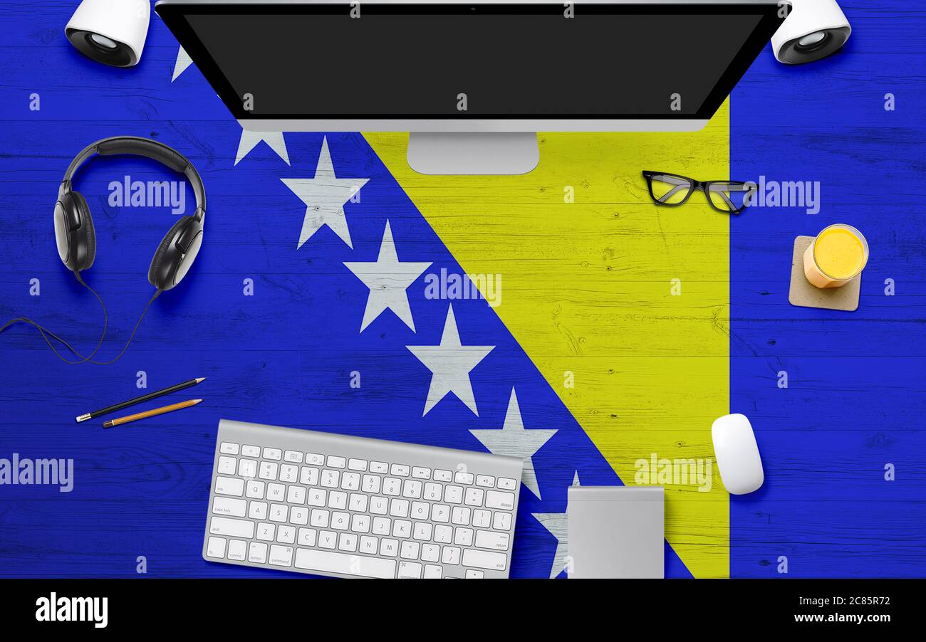 Bosnia Herzegovina flag background with headphone,computer keyboard and ...