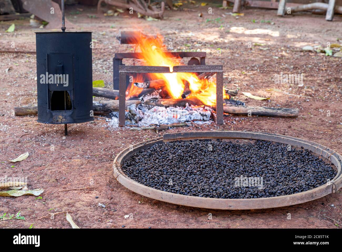 roasting coffee the old farm way, manual roaster, wood fire Stock Photo ...