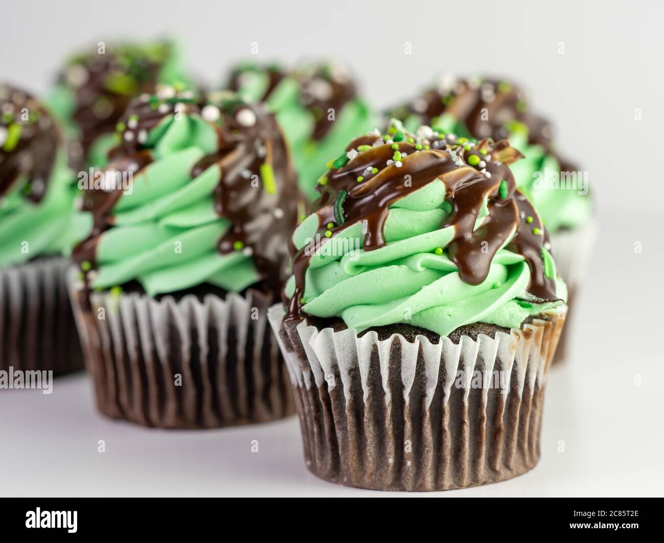 Chocolate cupcakes with green mint frosting Stock Photo - Alamy