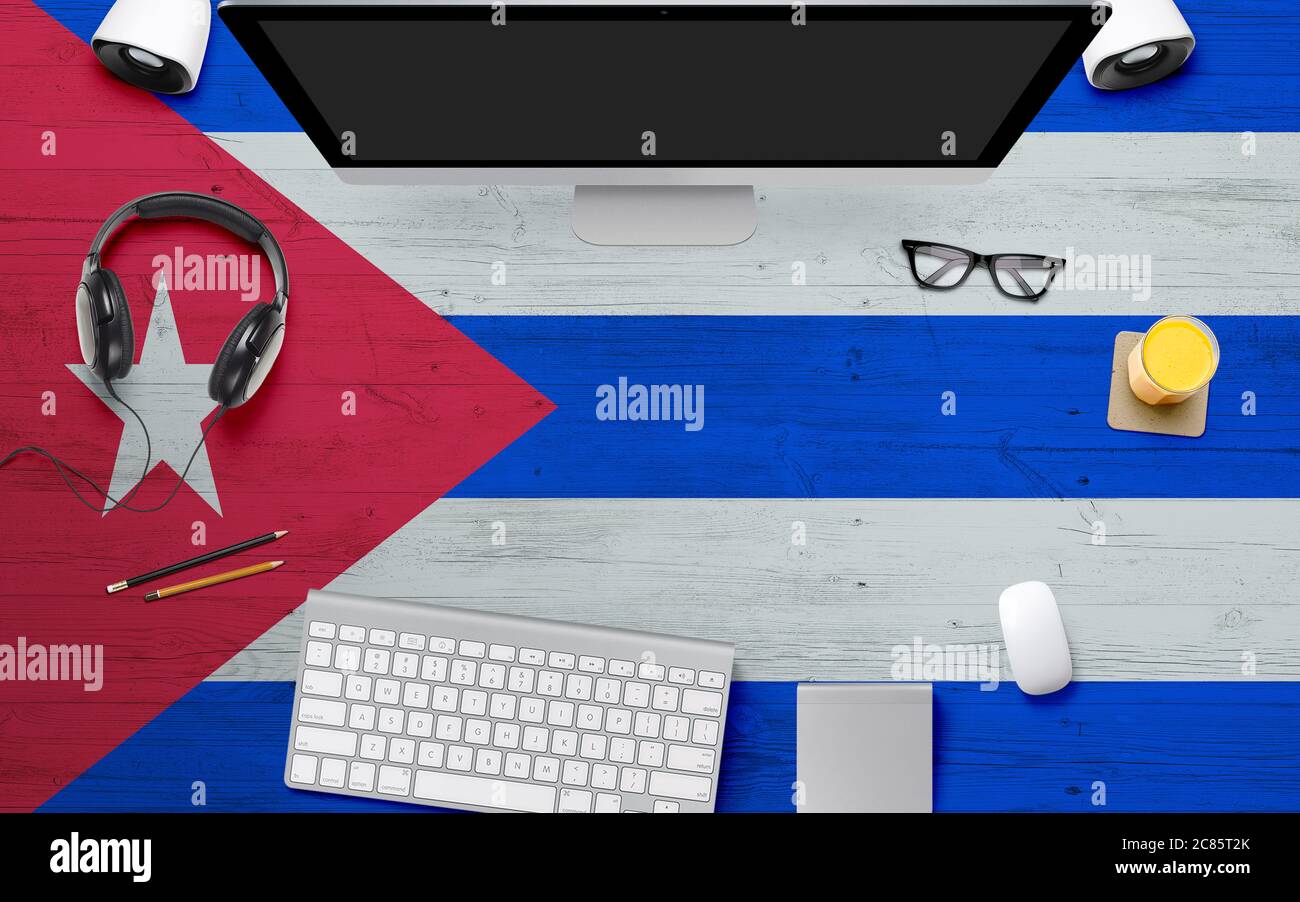 Cuba flag background with headphone,computer keyboard and mouse on ...