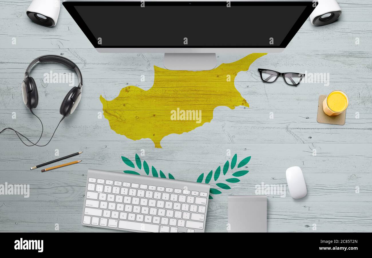 Cyprus flag background with headphone,computer keyboard and mouse on ...