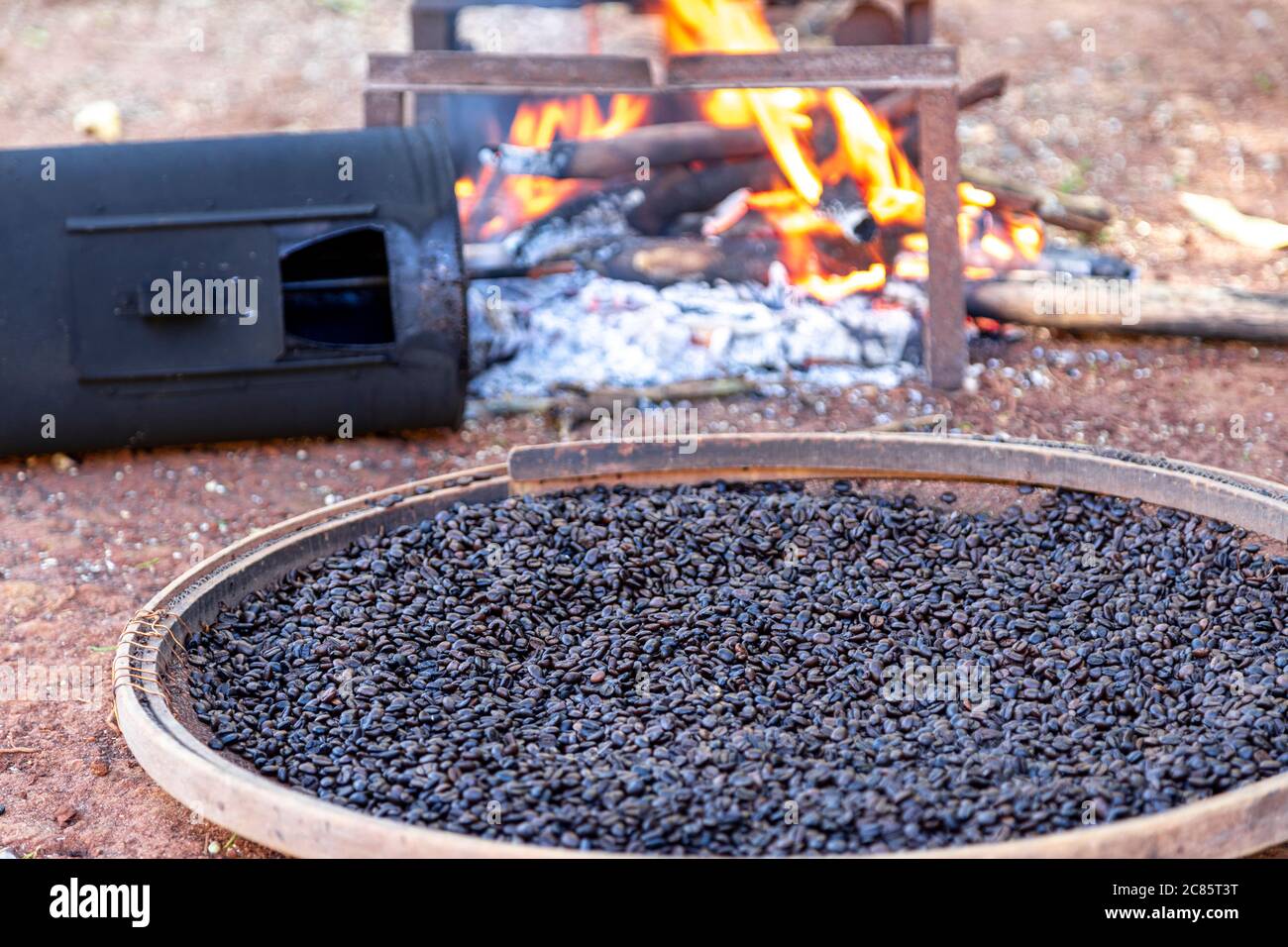 roasting coffee the old farm way, manual roaster, wood fire Stock Photo ...