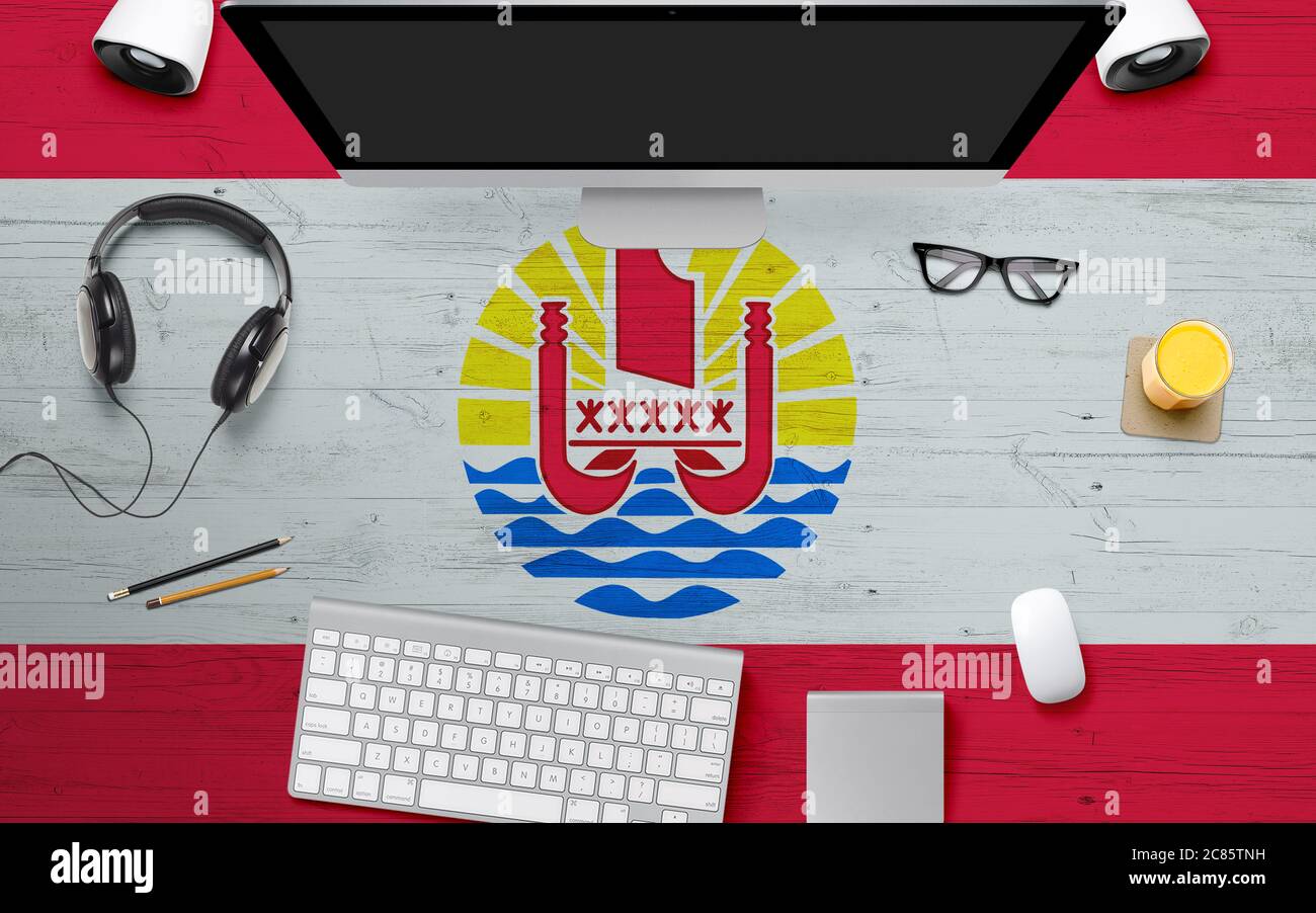 French Polynesia flag background with headphone,computer keyboard and ...
