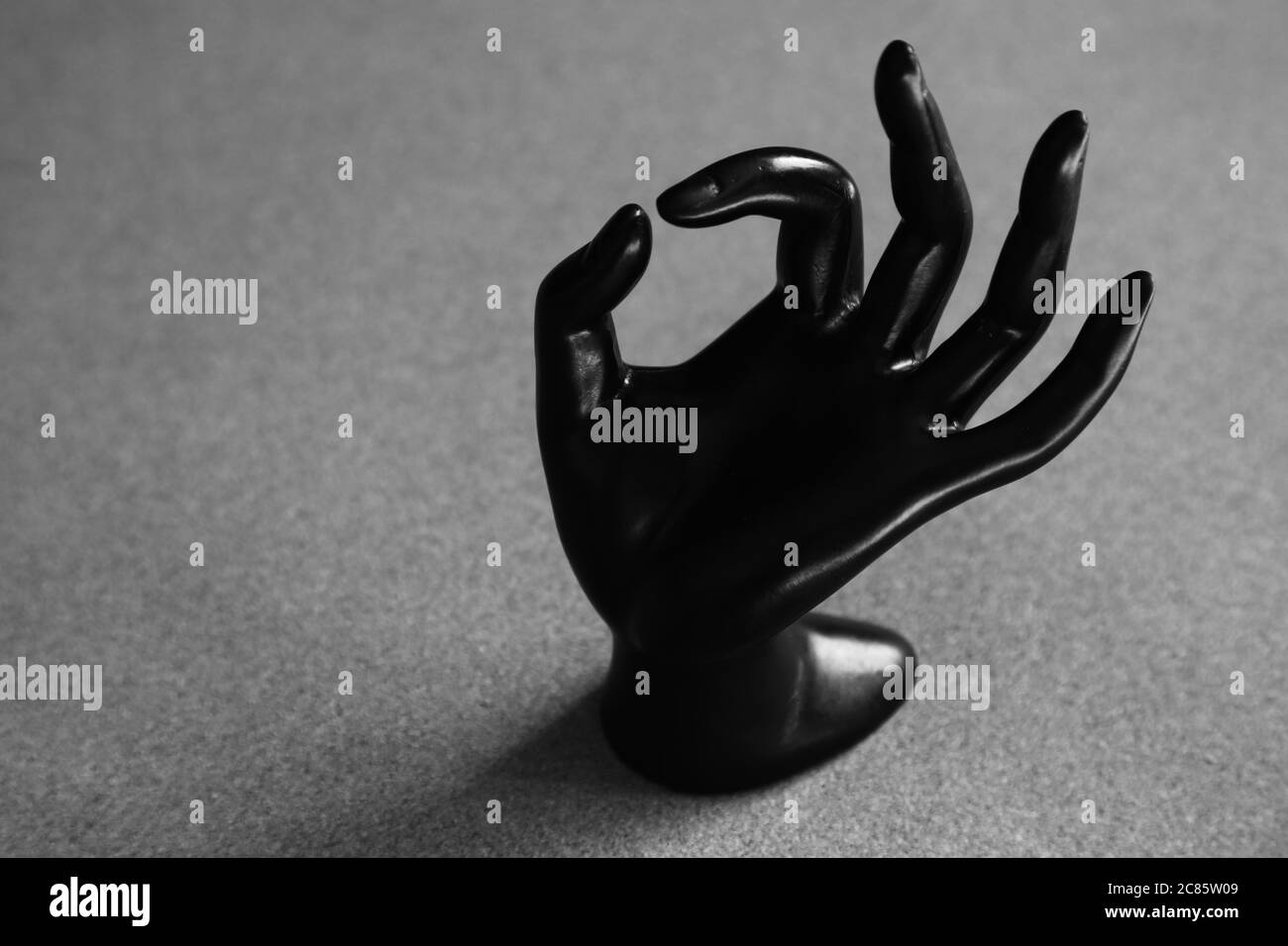 Black Lives Matter concept image consisting of hand isolated on a grey ...