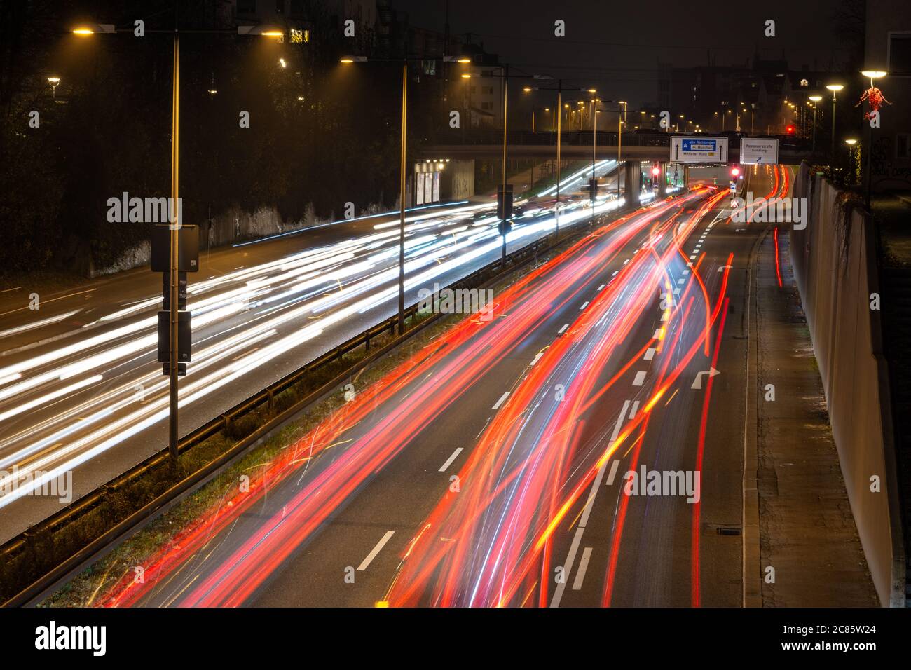Fast moving traffic passes along a German highway which leads from ...