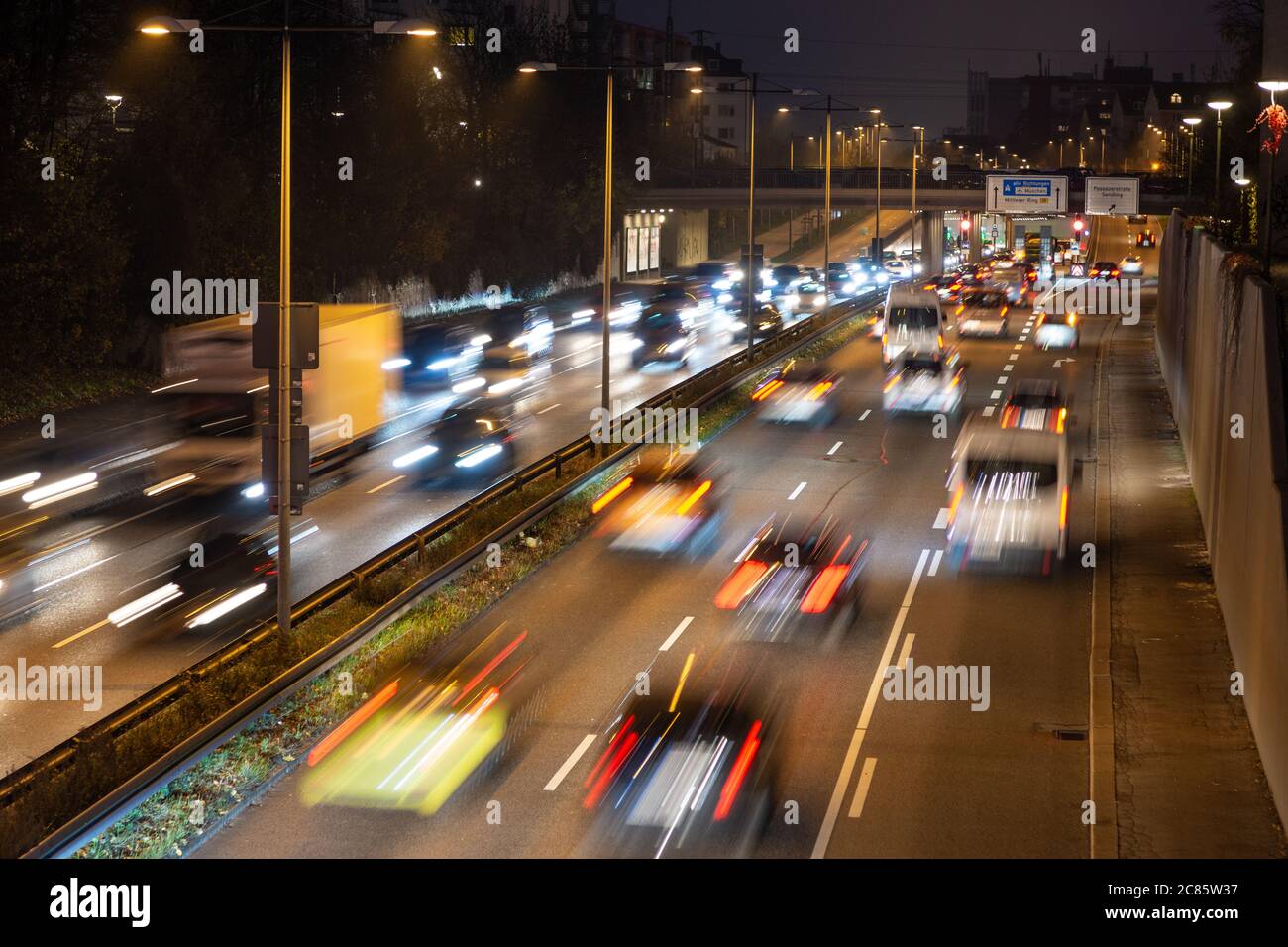 Fast moving traffic passes along a German highway which leads from ...